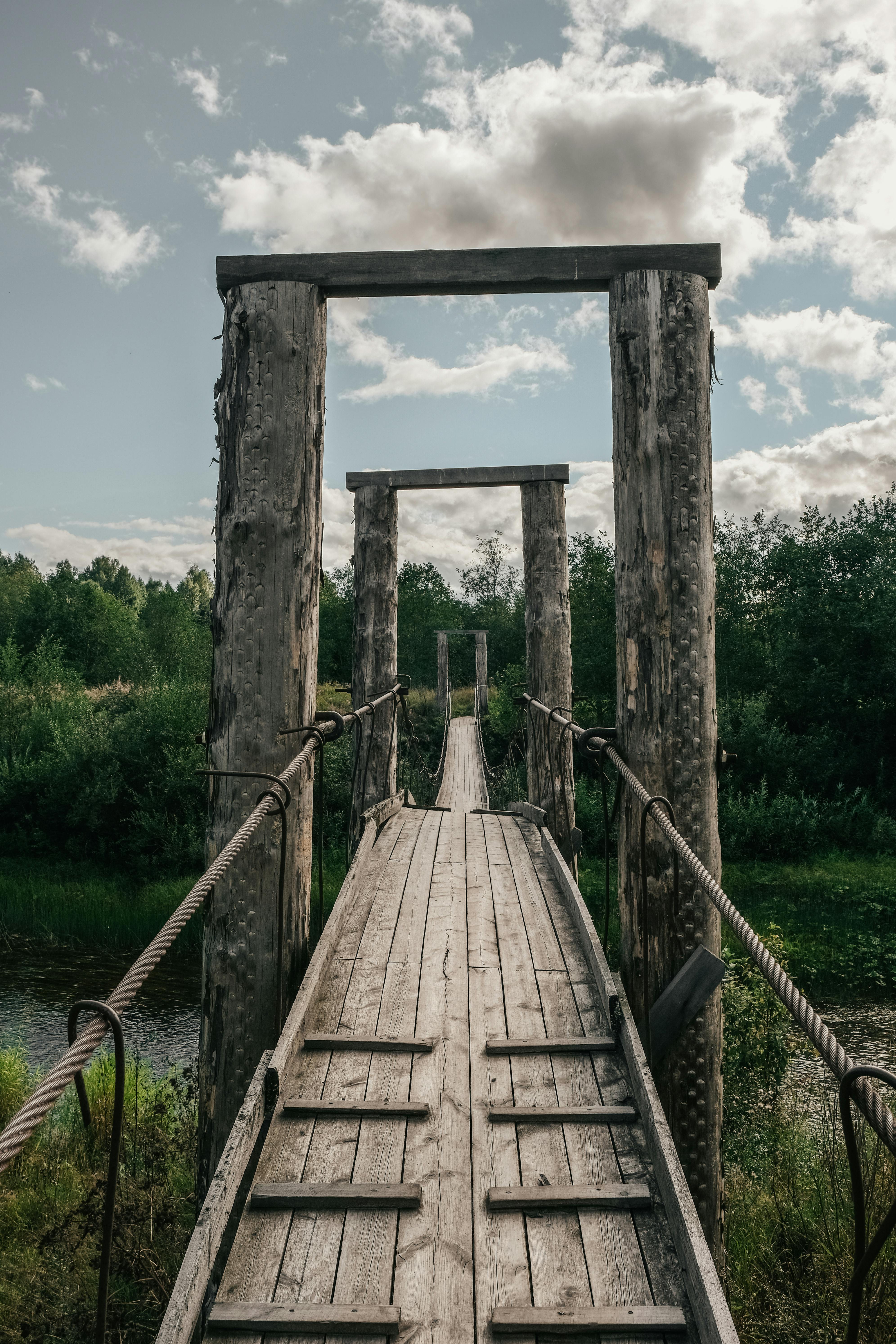Brown Wooden Walk Bridge Over the River · Free Stock Photo