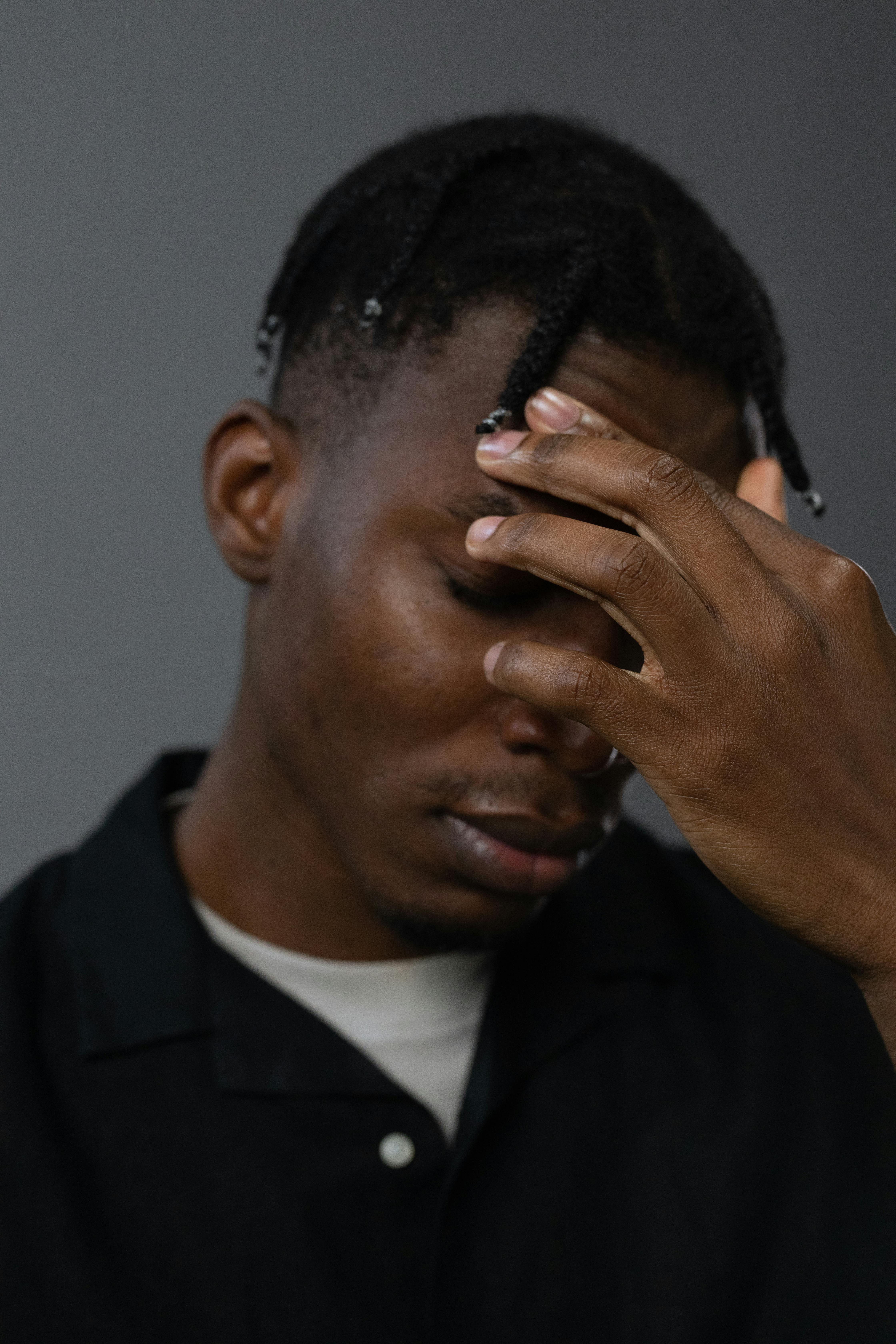 Close-up Photo of Stressed Man · Free Stock Photo