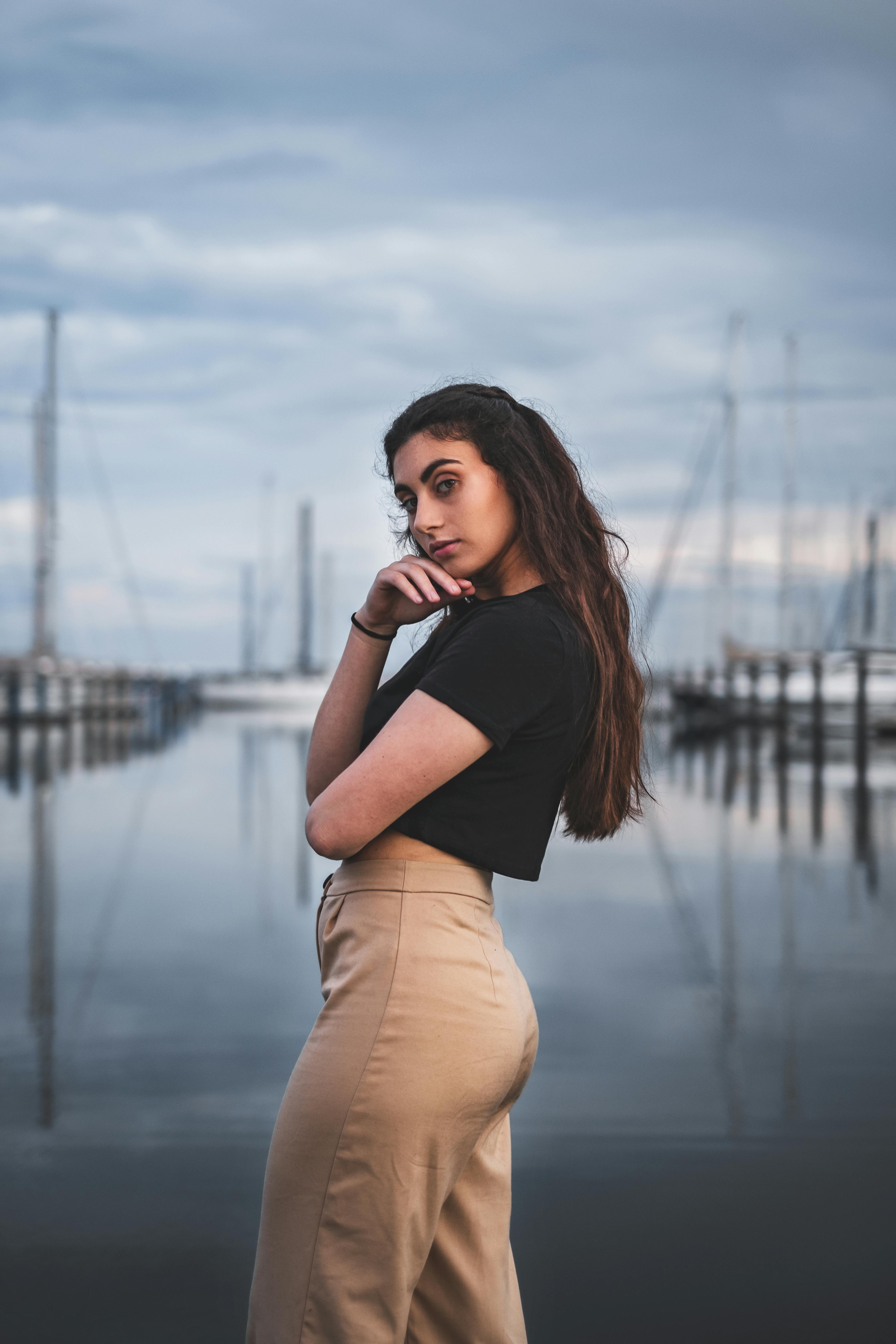 Woman Posing on Glass · Free Stock Photo