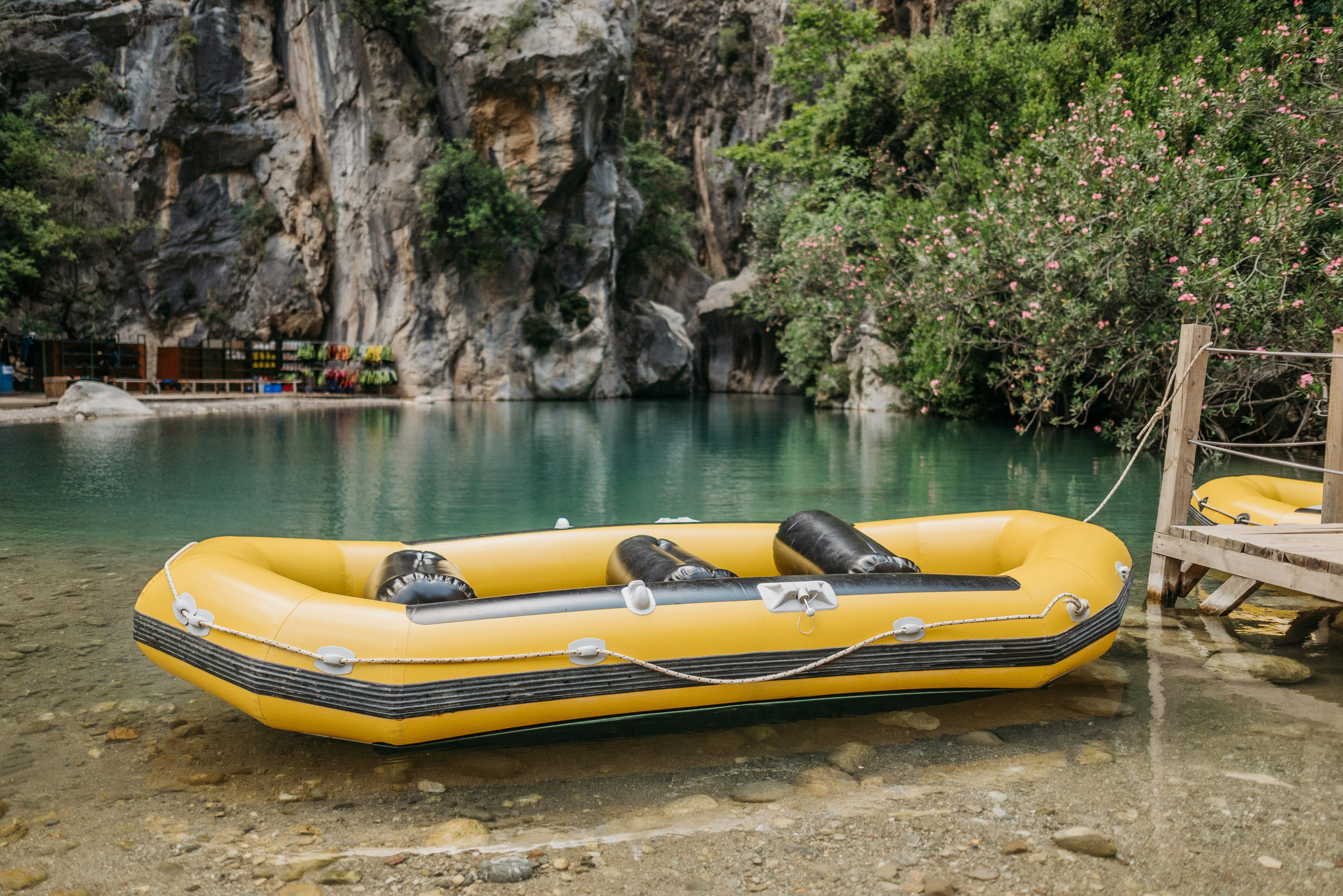 Yellow Inflatable Boat Moored at a Lake Shore, Göynük Canyon, Turkey ...