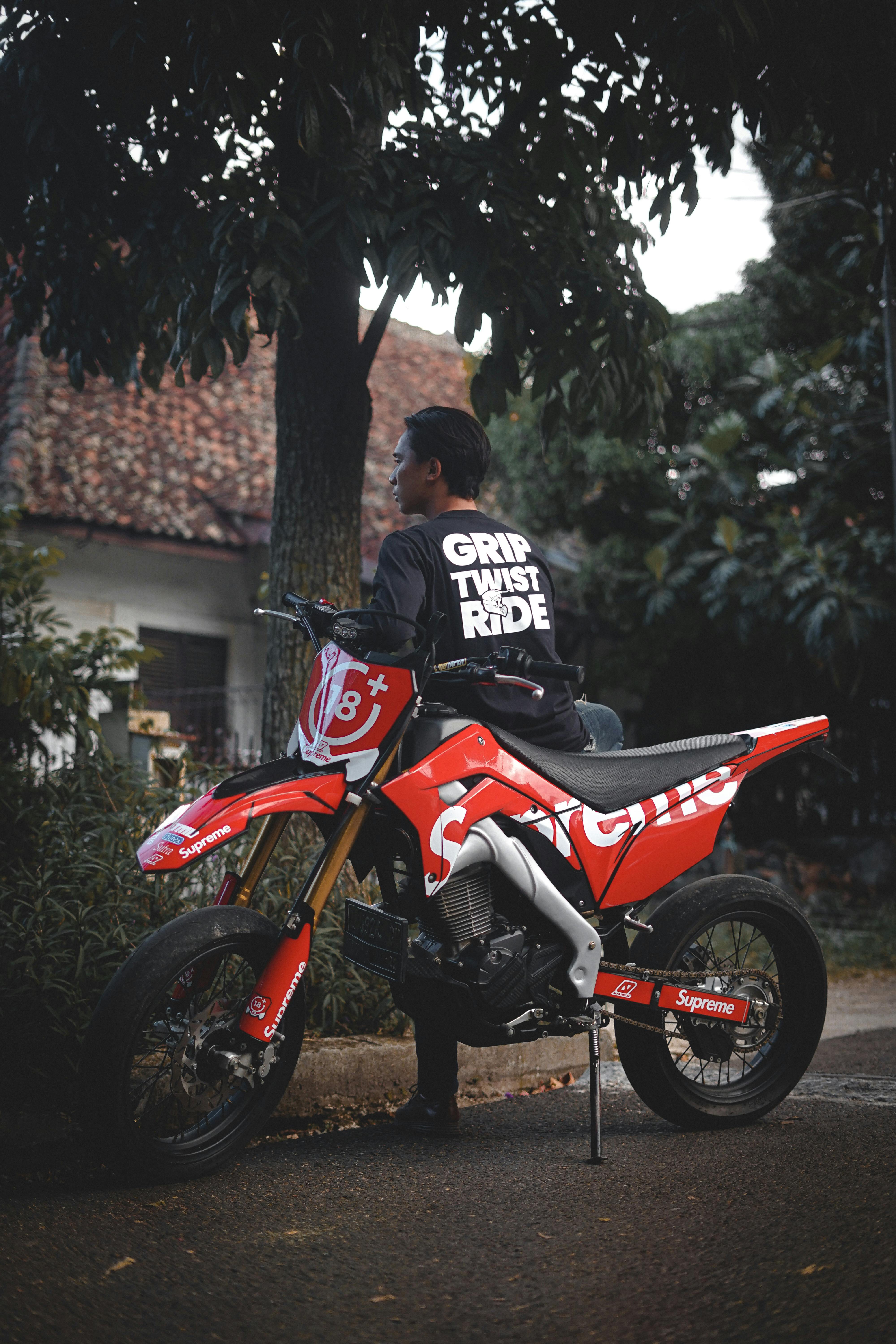 Two Men Riding a Motorcycle · Free Stock Photo