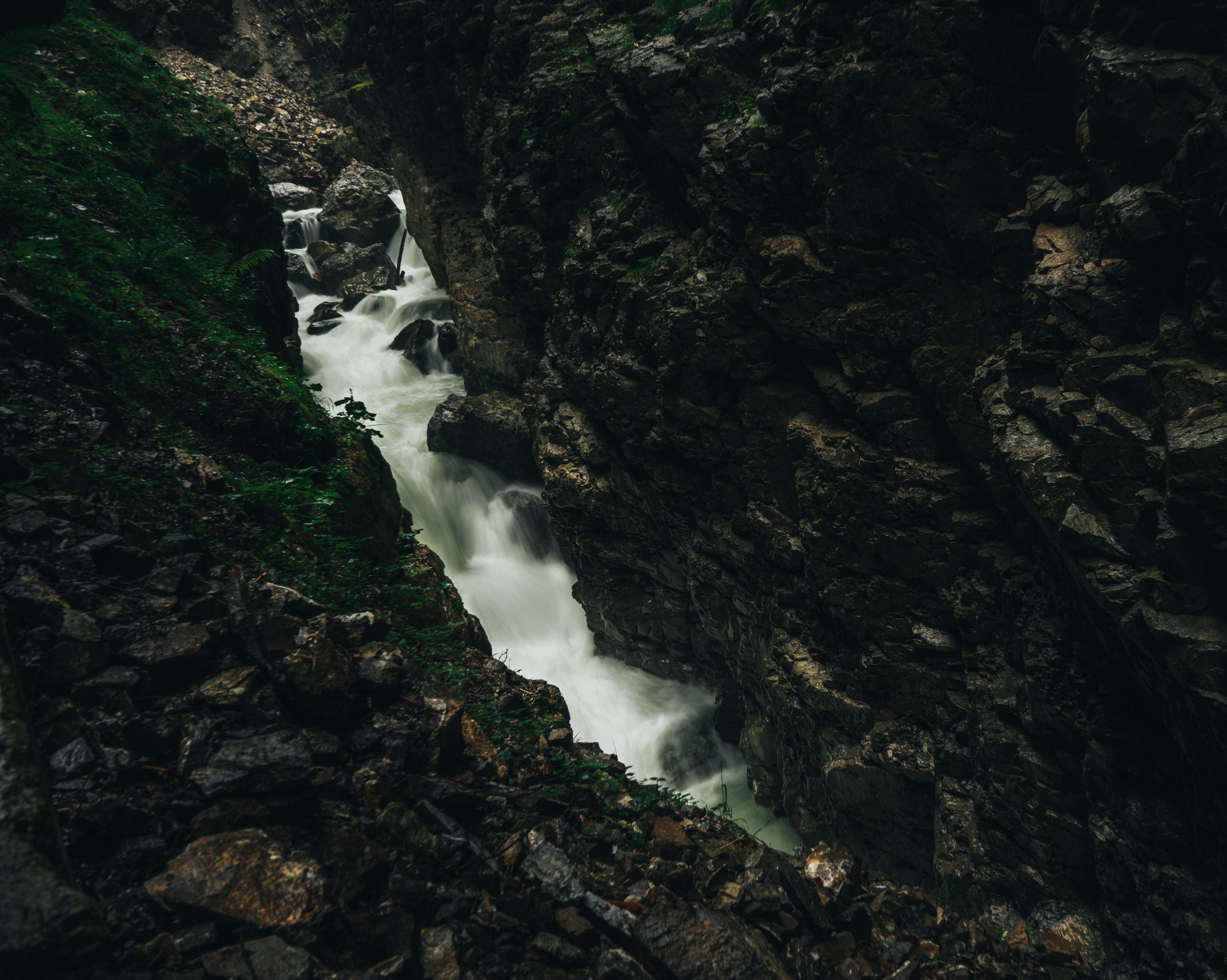 A Person Under The Flowing Waterfall · Free Stock Photo