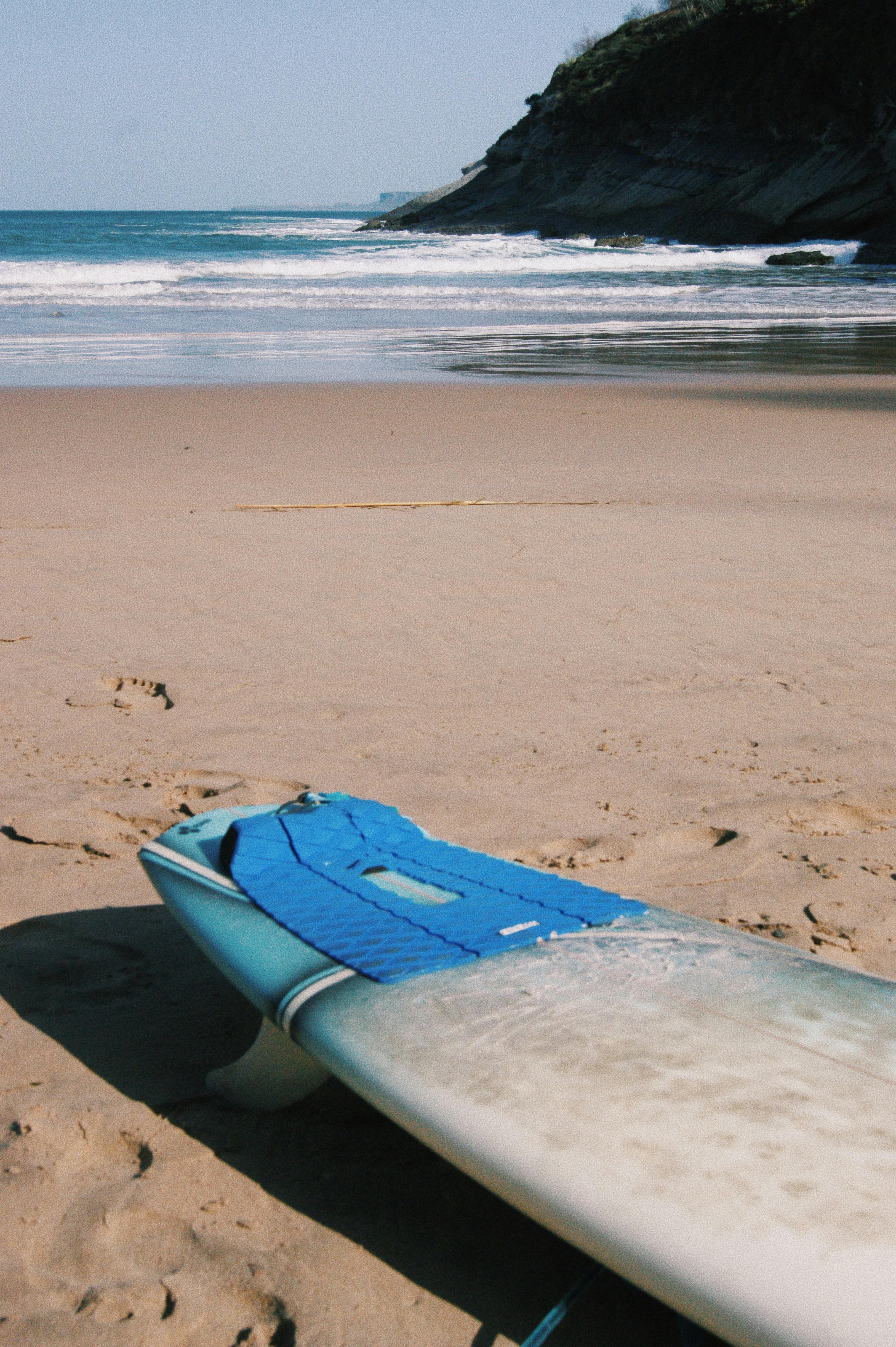 Blue Surfboard on the Beach · Free Stock Photo