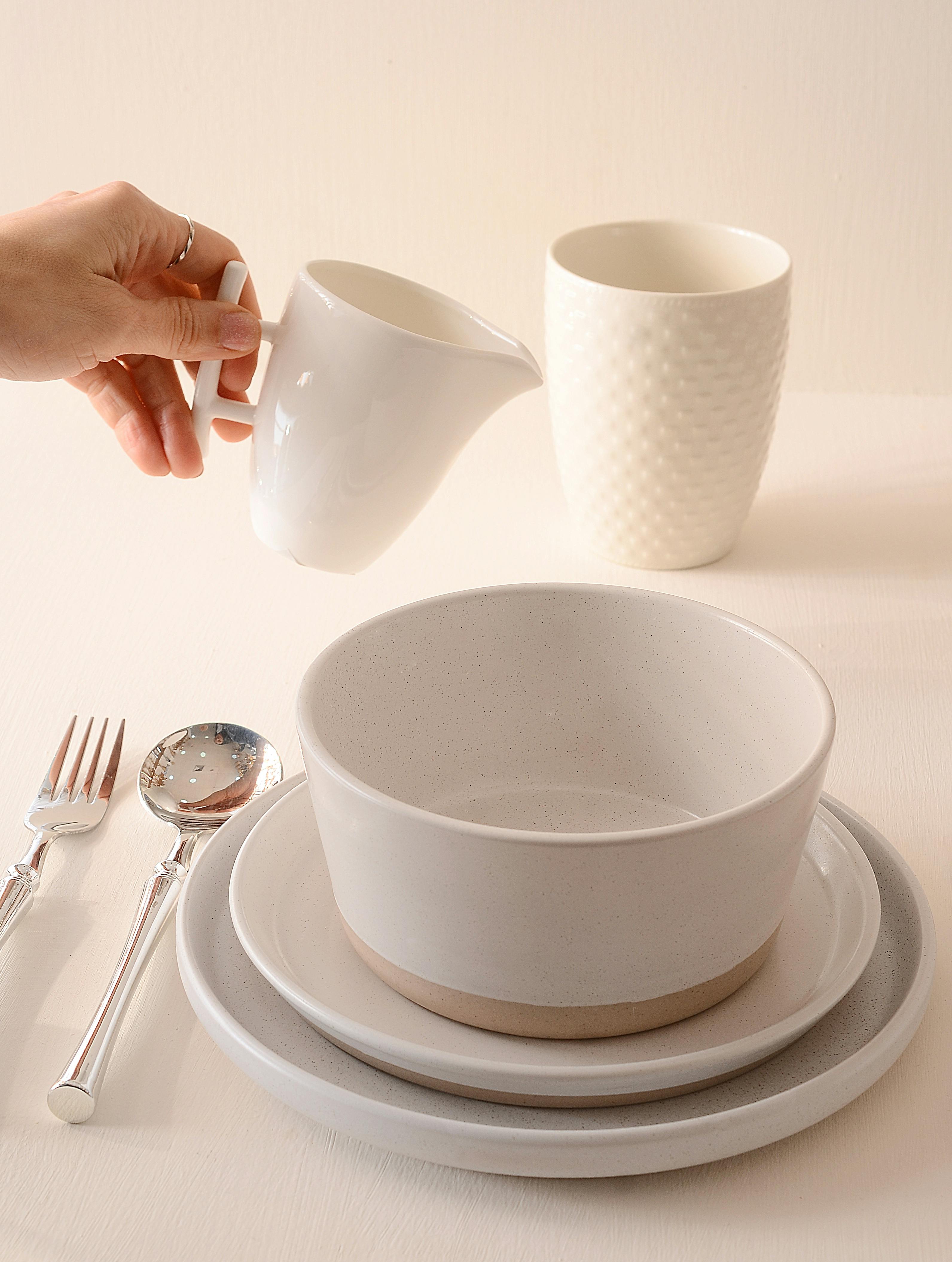 A Person Holding a Stay Safe Sign Board · Free Stock Photo