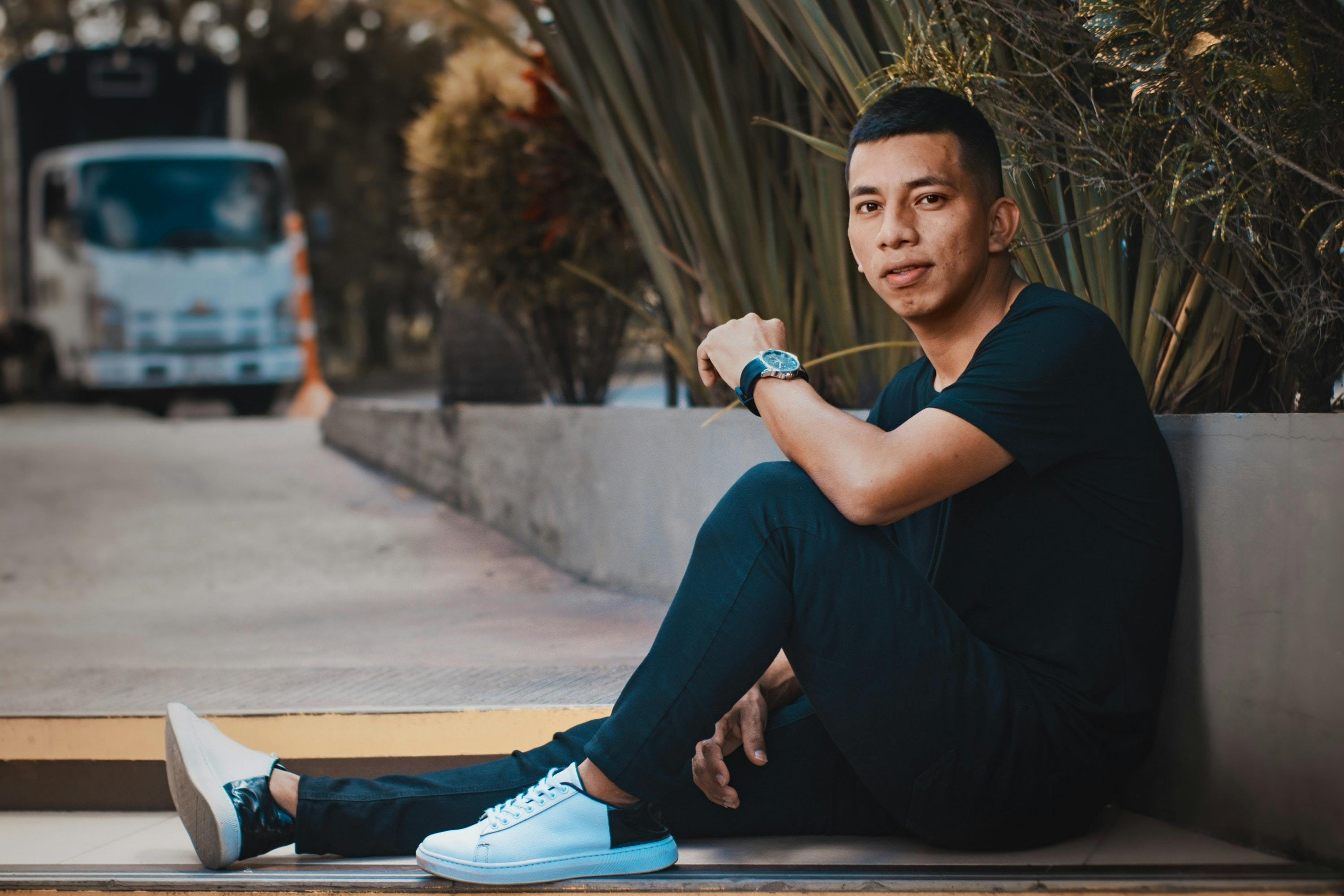 A Man in White Shirt Doing Handstand while Covering His Face · Free ...