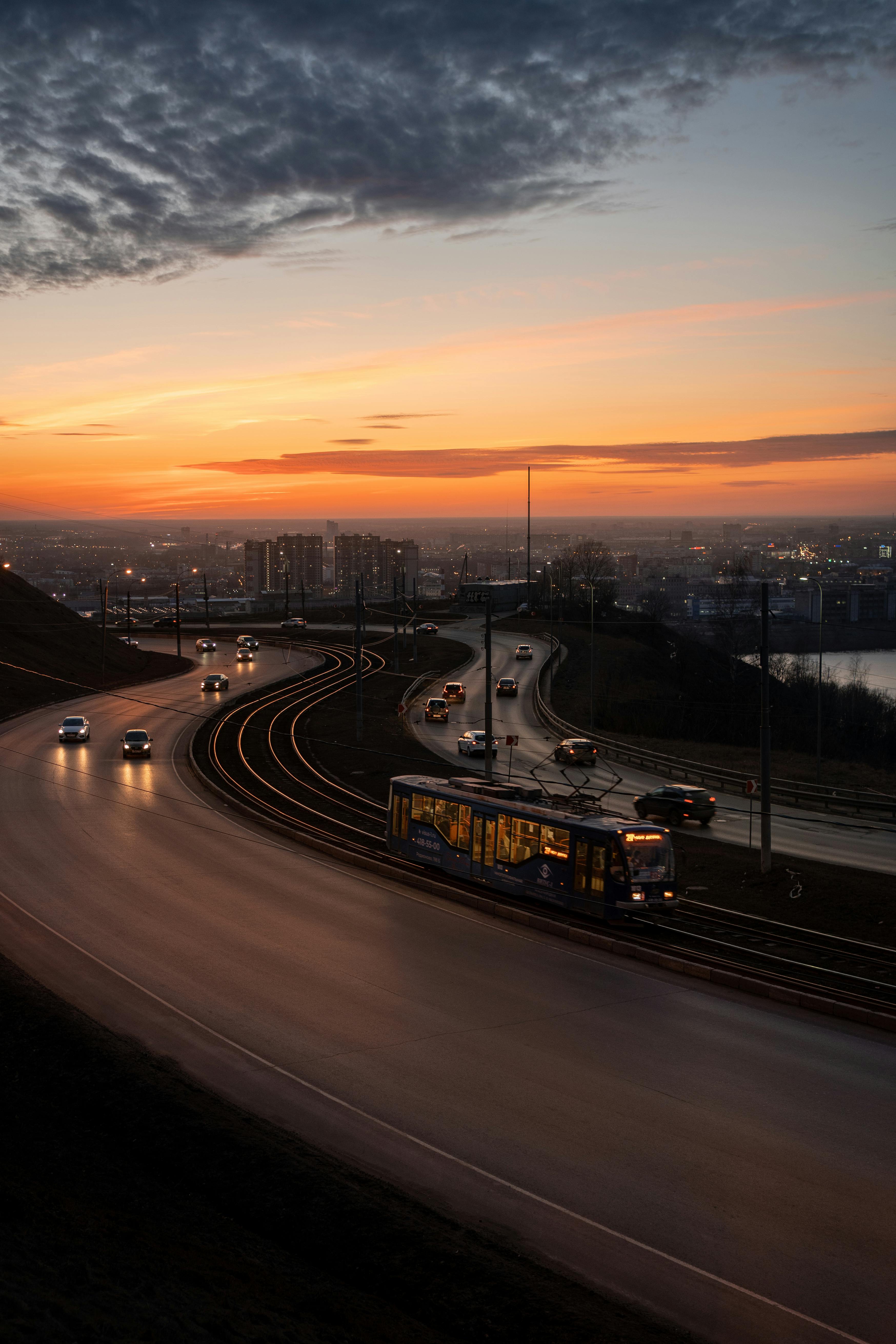 Cars On Road During Golden Hour · Free Stock Photo