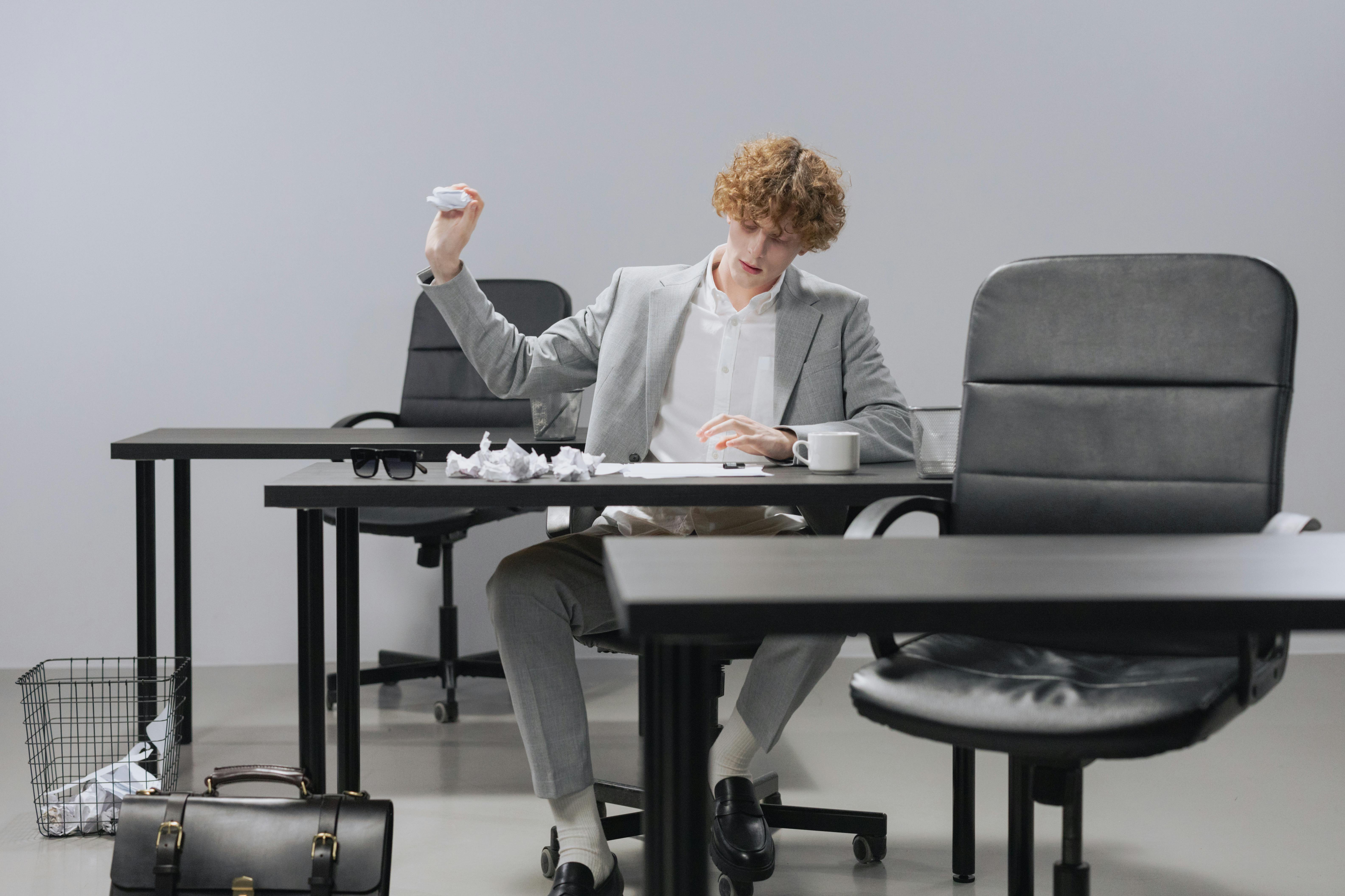 A Man Sitting at the Table · Free Stock Photo
