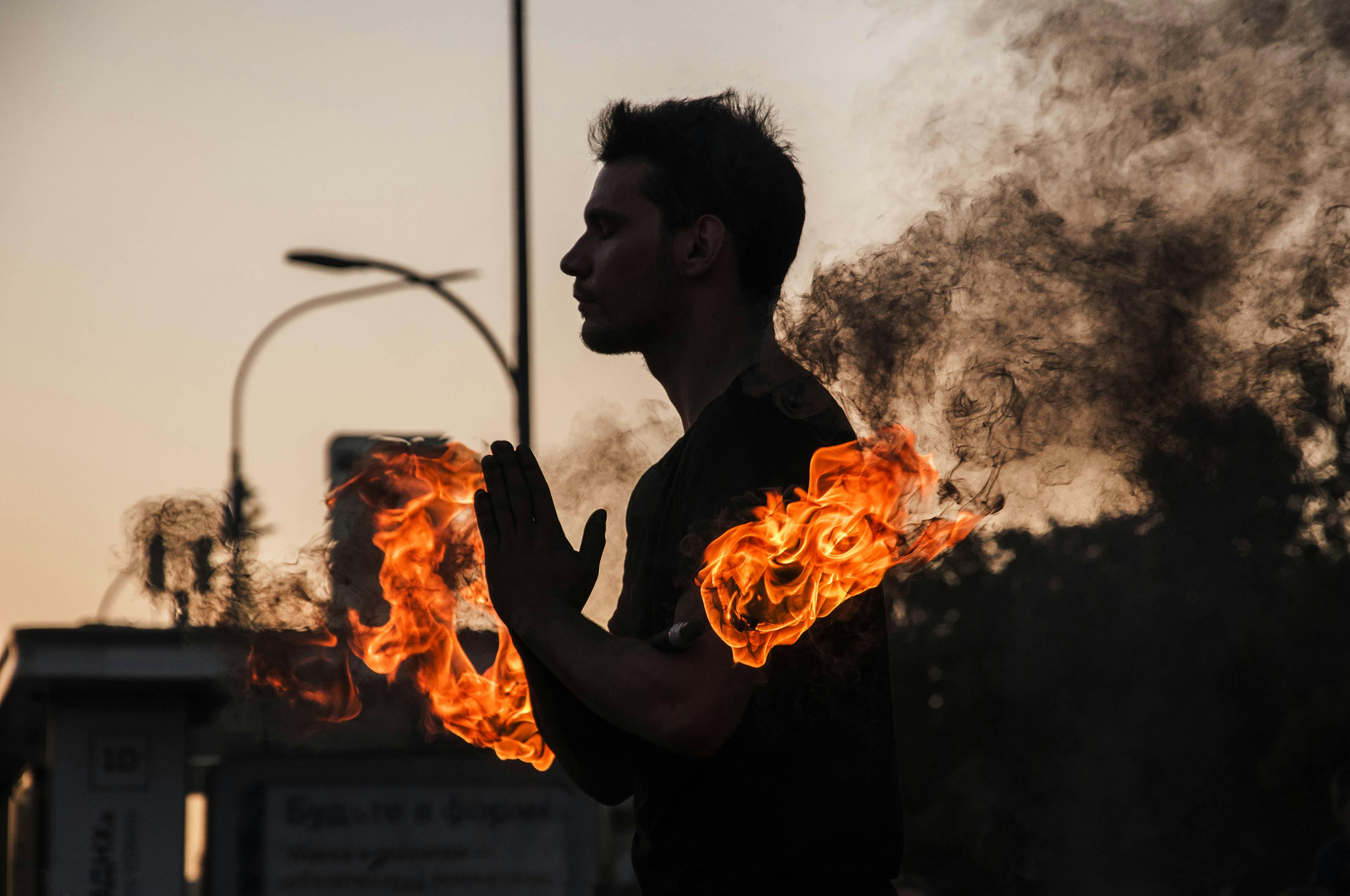 Person Silhouette Near the Fire · Free Stock Photo