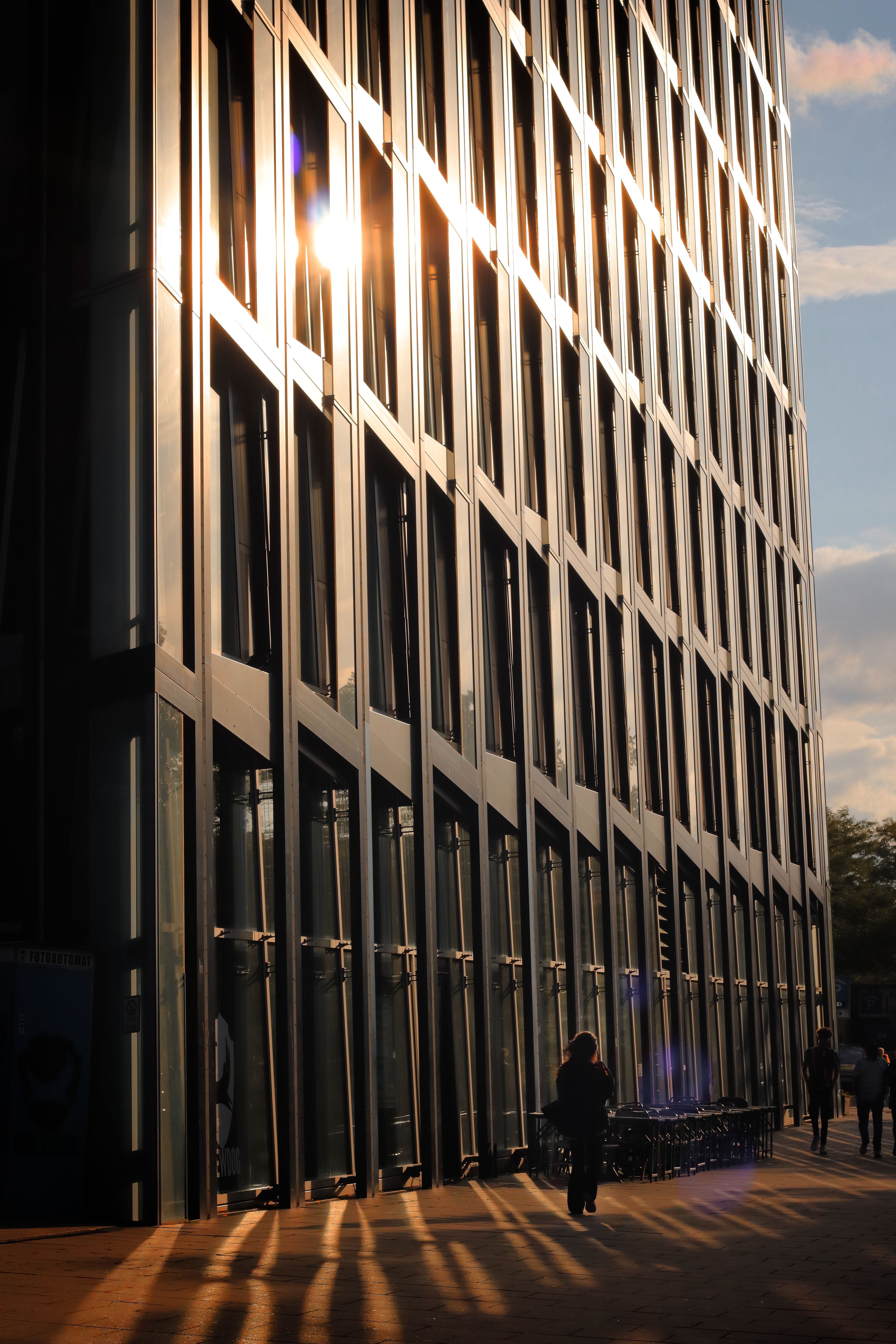 People Standing Near Gray Concrete Building · Free Stock Photo