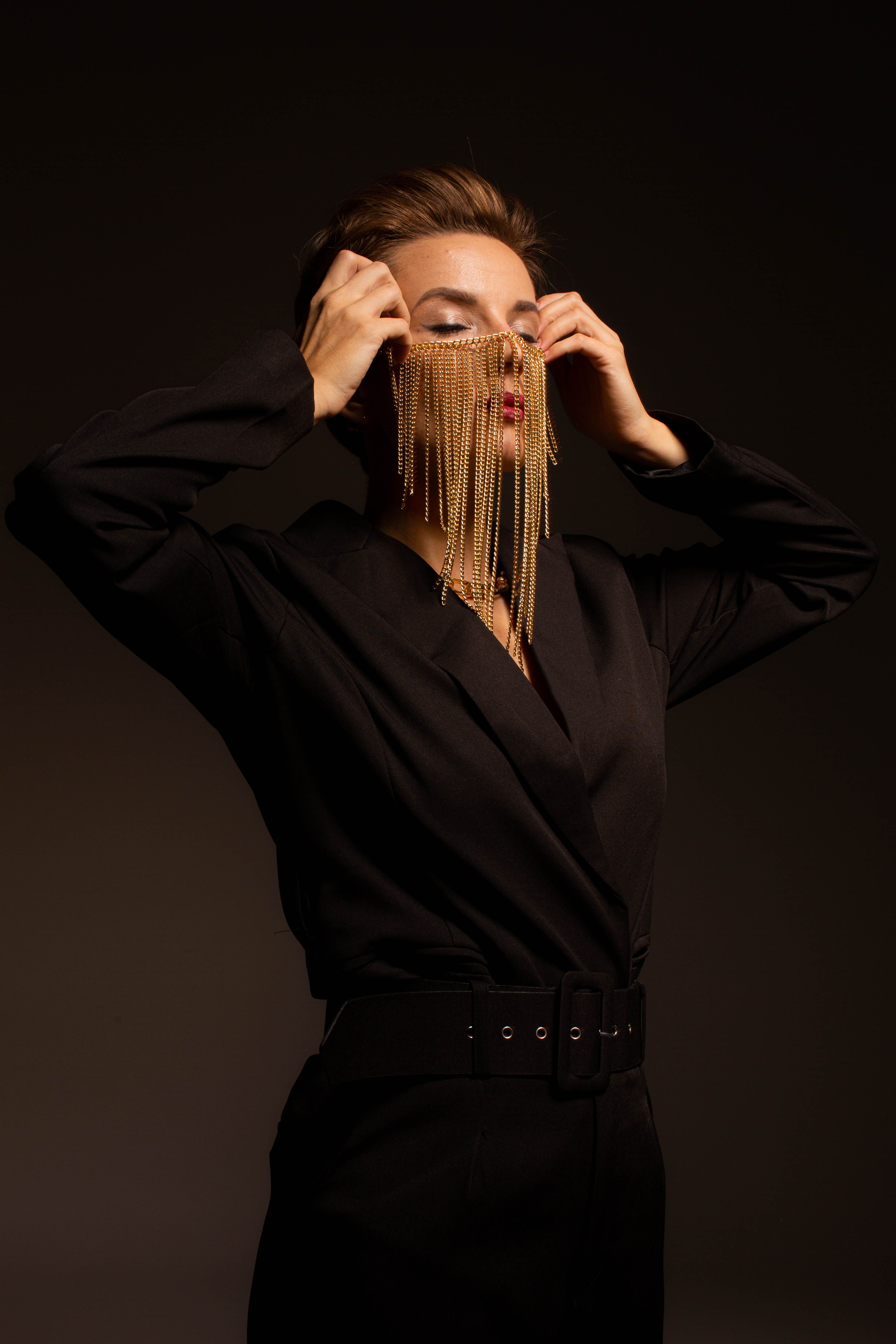 Woman Posing in Black Studio Background · Free Stock Photo