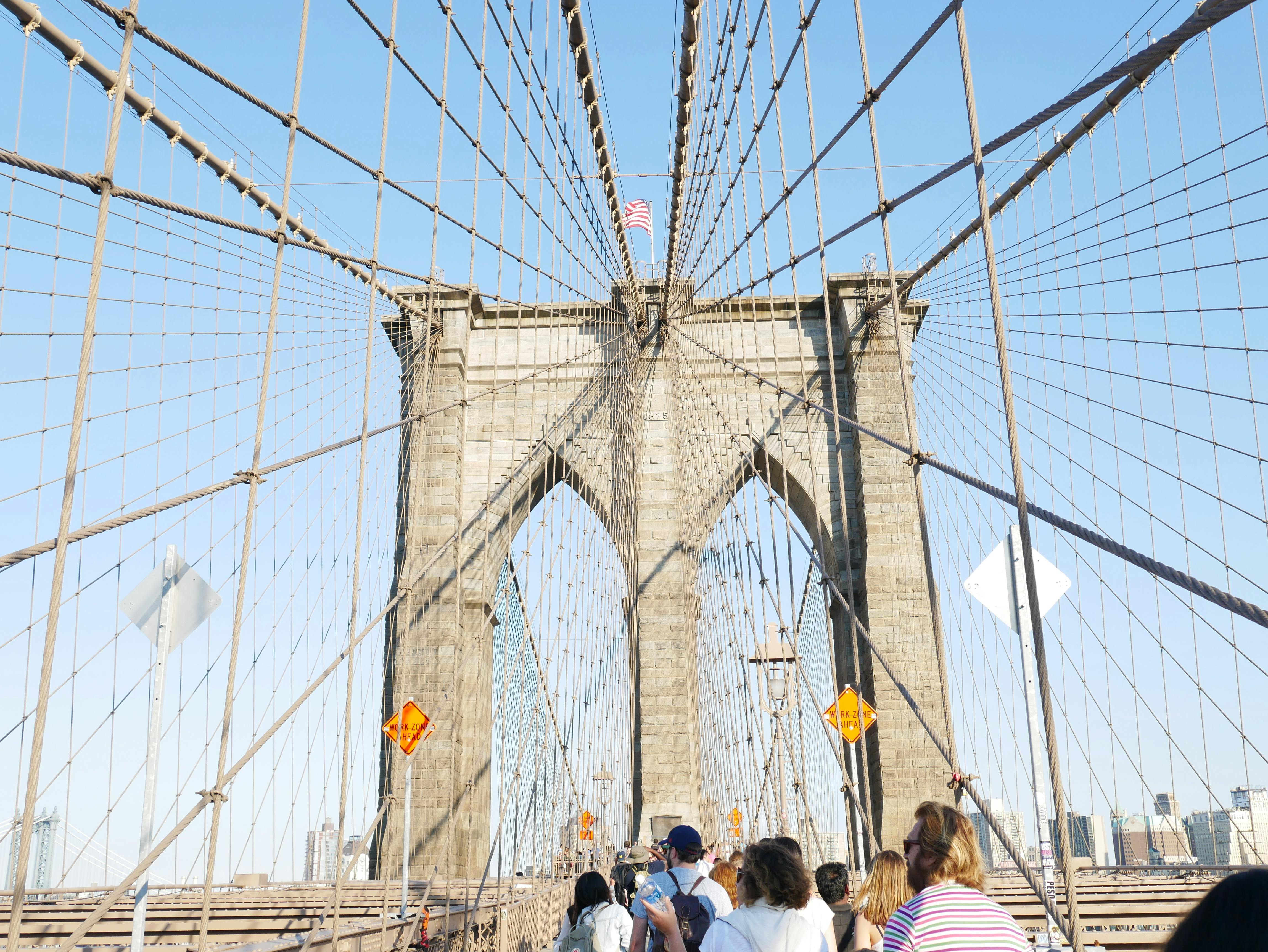 People Looking Down A Bridge · Free Stock Photo
