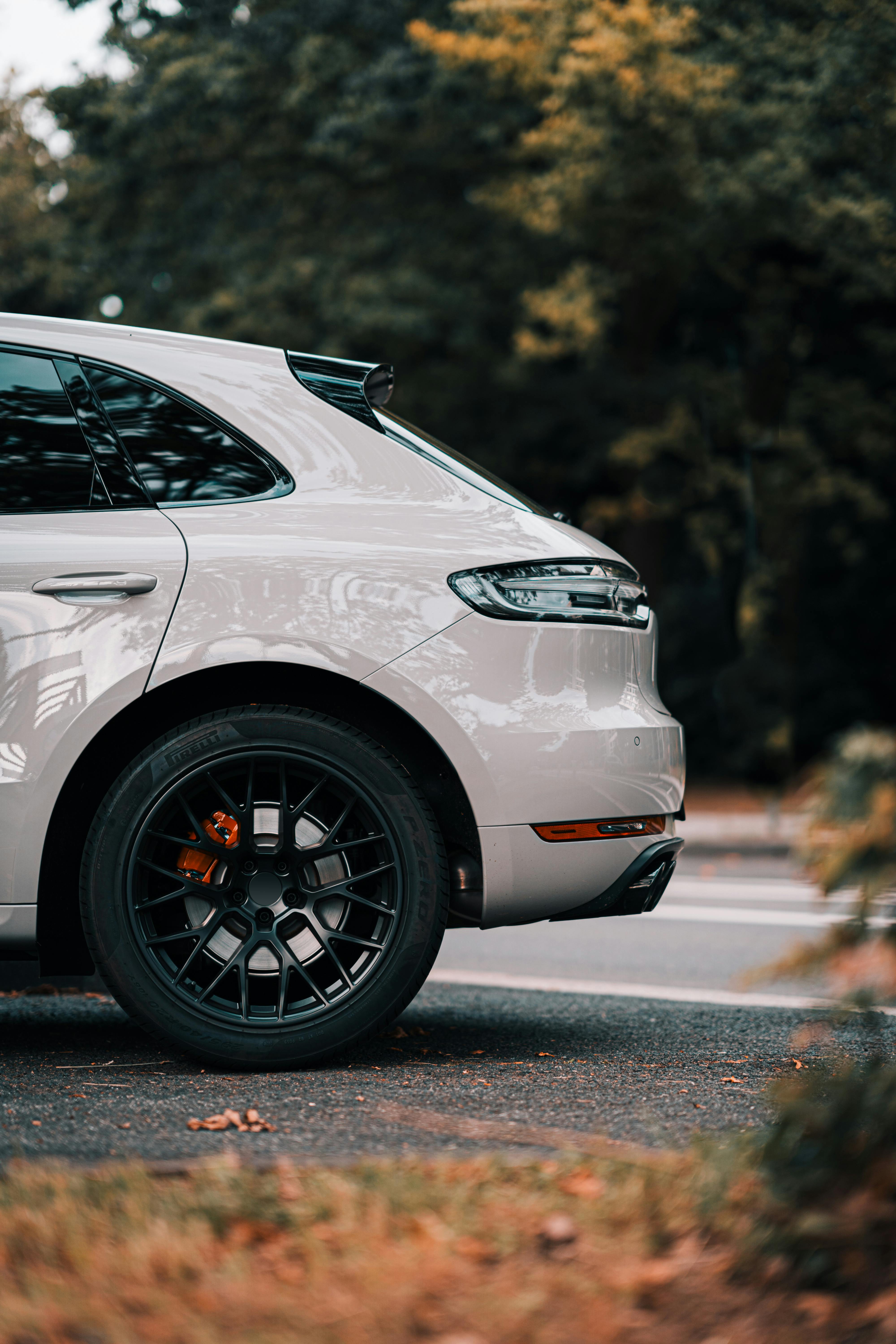White Car With Gray 5 Lug Auto Rims · Free Stock Photo