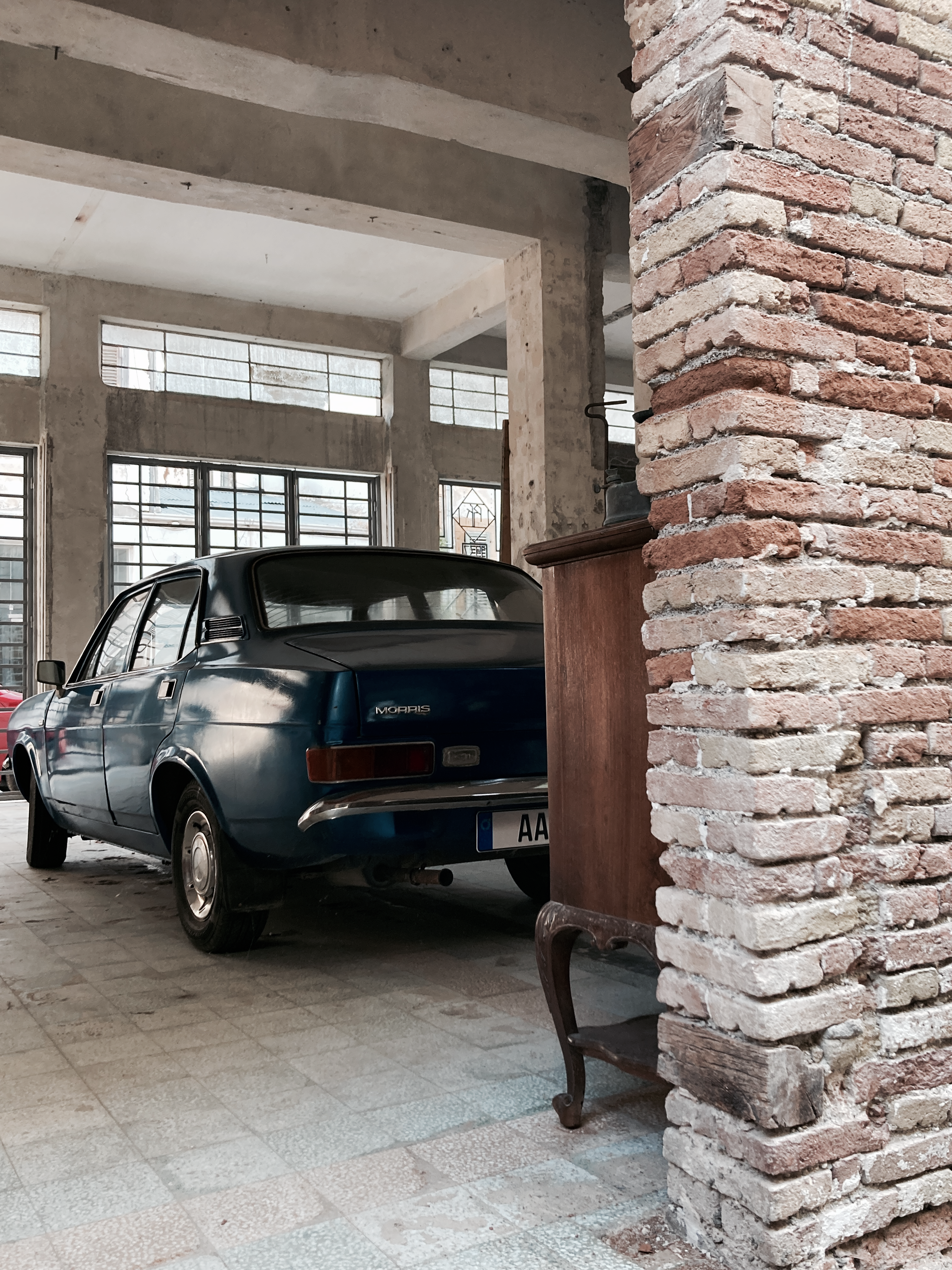 Blue Car Parked in the Garage · Free Stock Photo