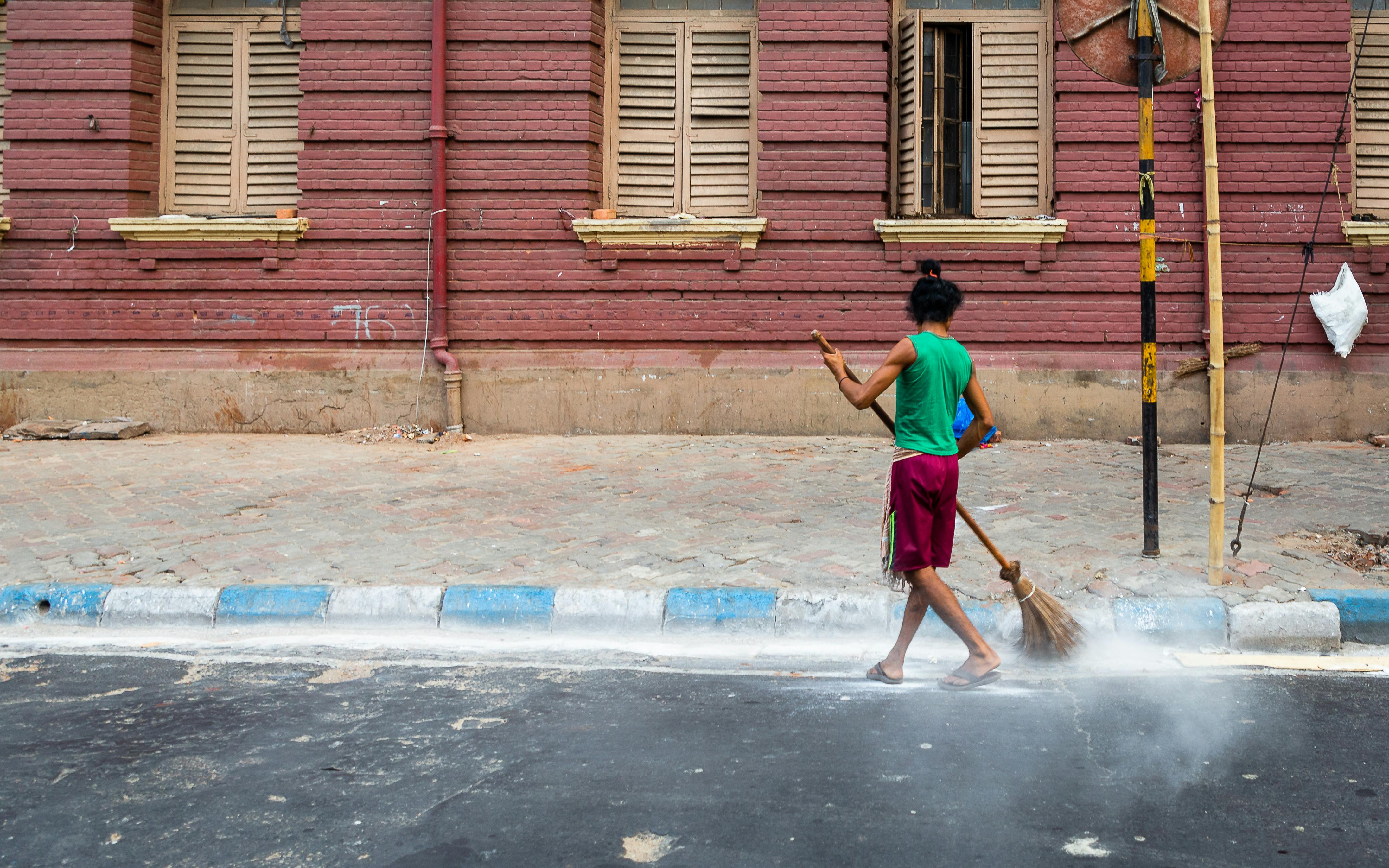 Man Cleaning Road · Free Stock Photo