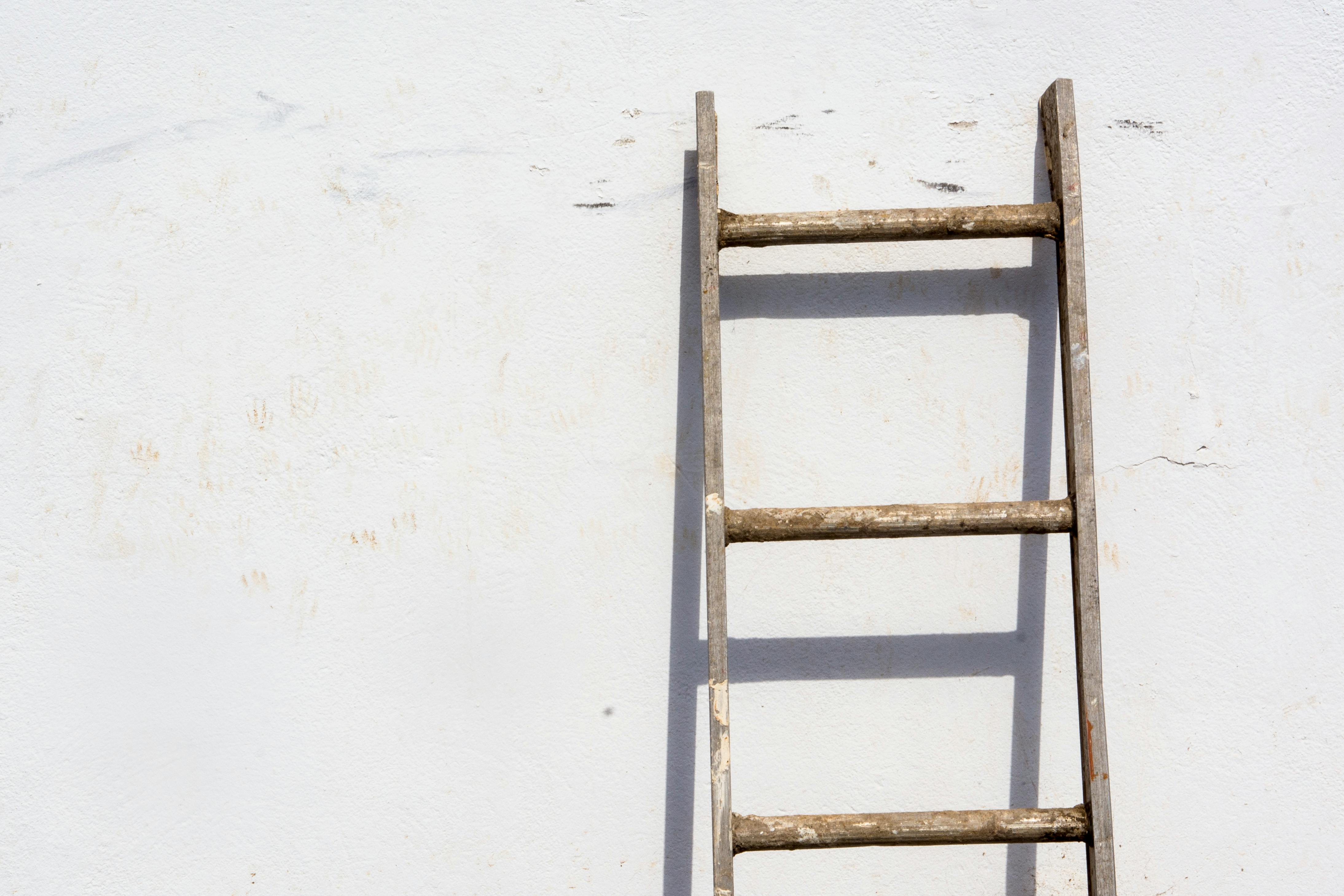 Wooden Ladder Leaning on the Blue House · Free Stock Photo