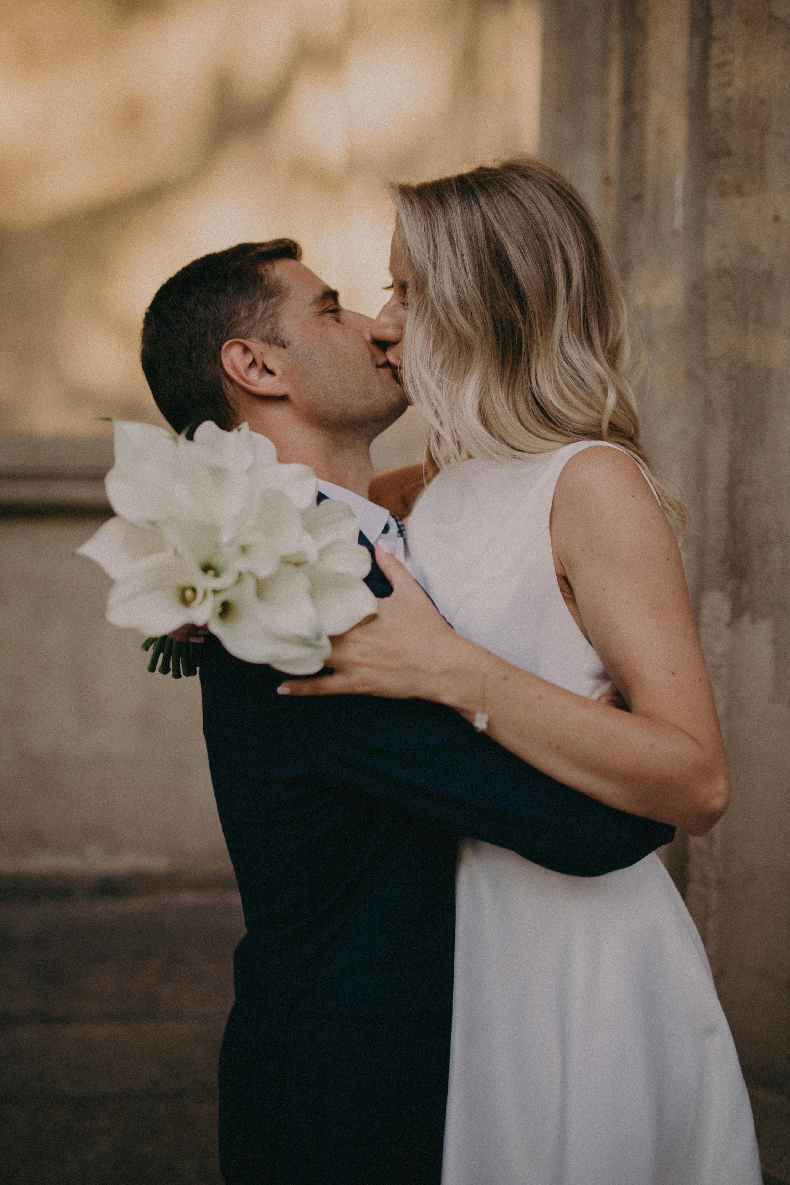 Groom Kissing Bride Neck · Free Stock Photo