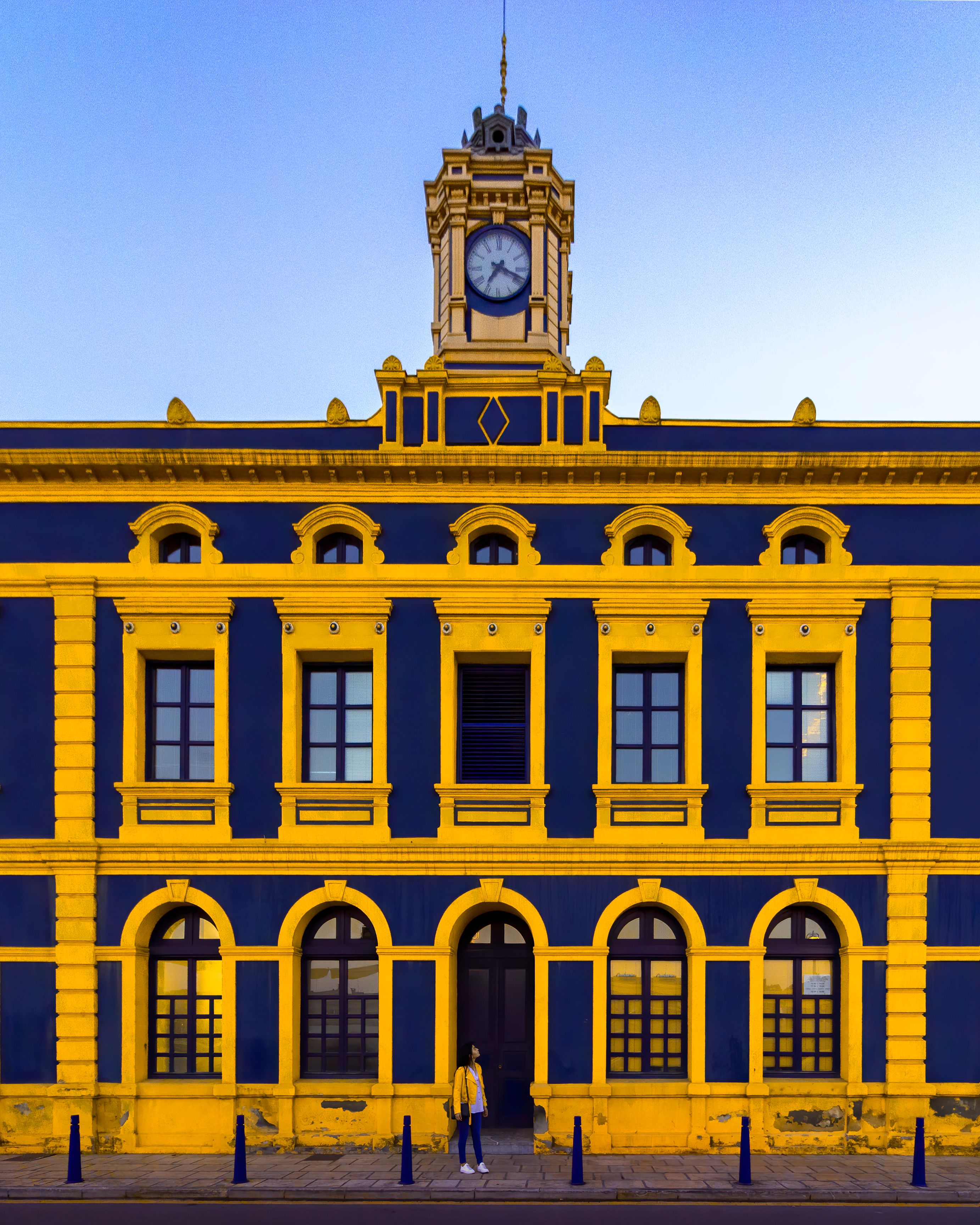 Yellow and Blue Concrete Building Under Blue Sky · Free Stock Photo