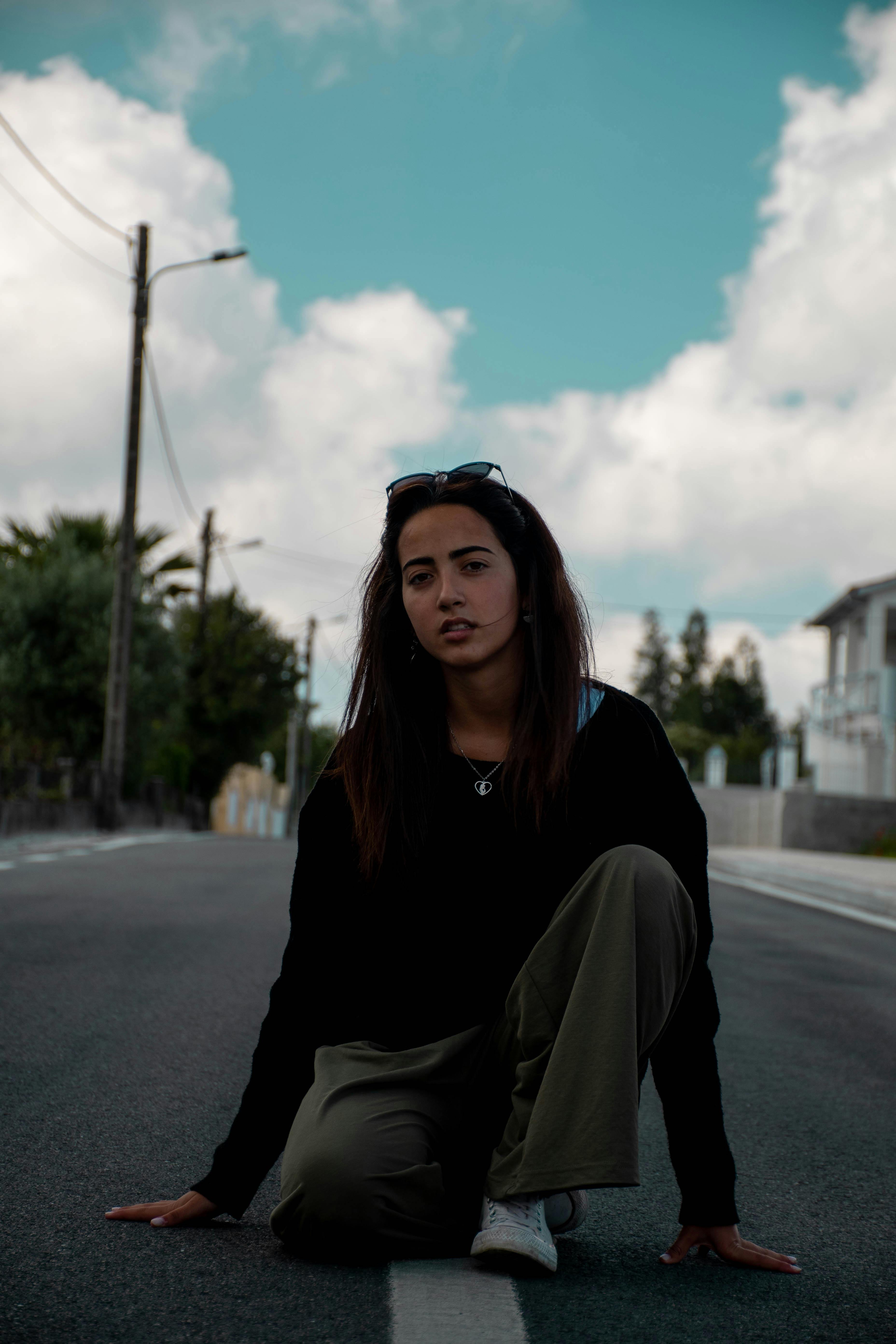 Woman Touching the Ground · Free Stock Photo