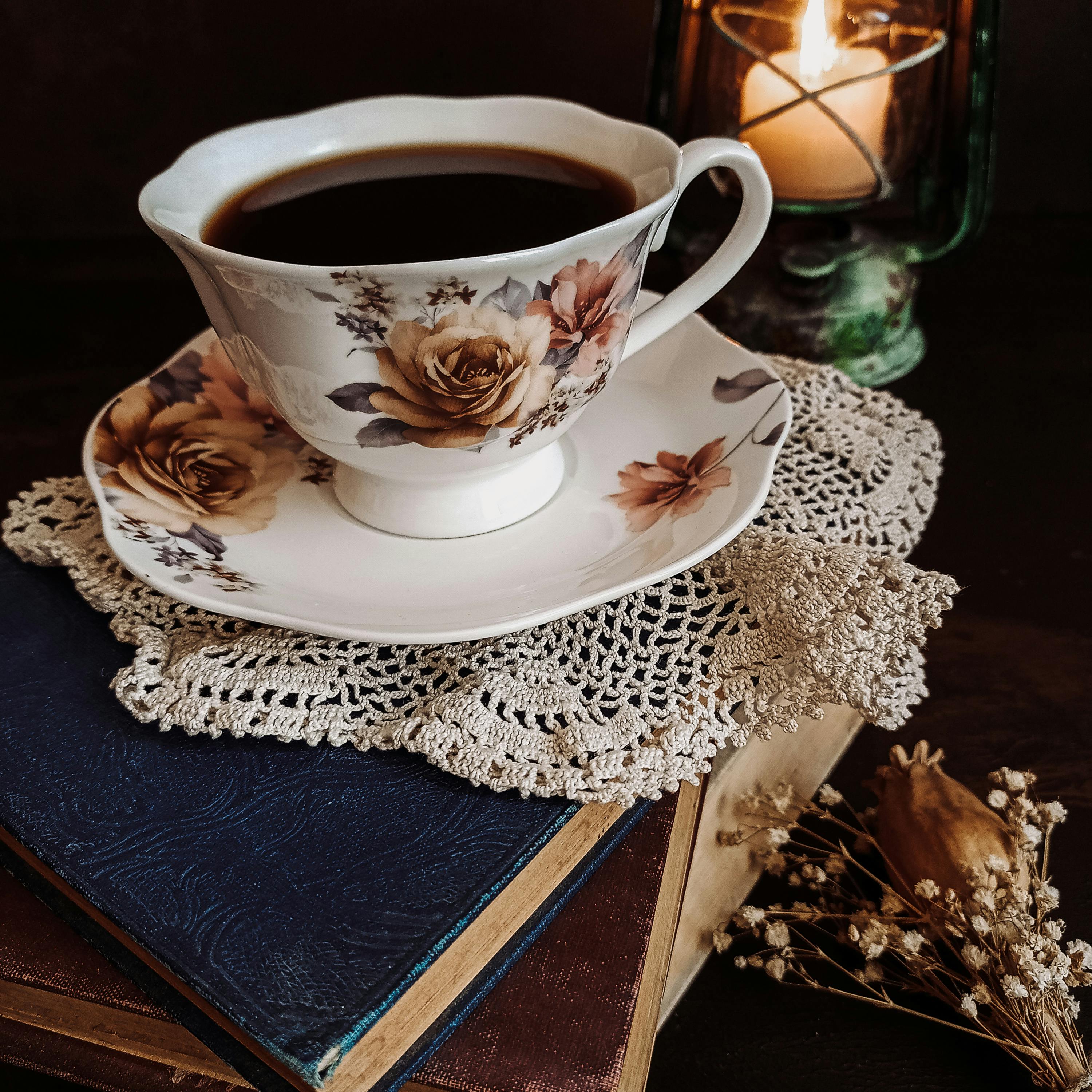 Cup of Coffee on Stack of Books by Window · Free Stock Photo