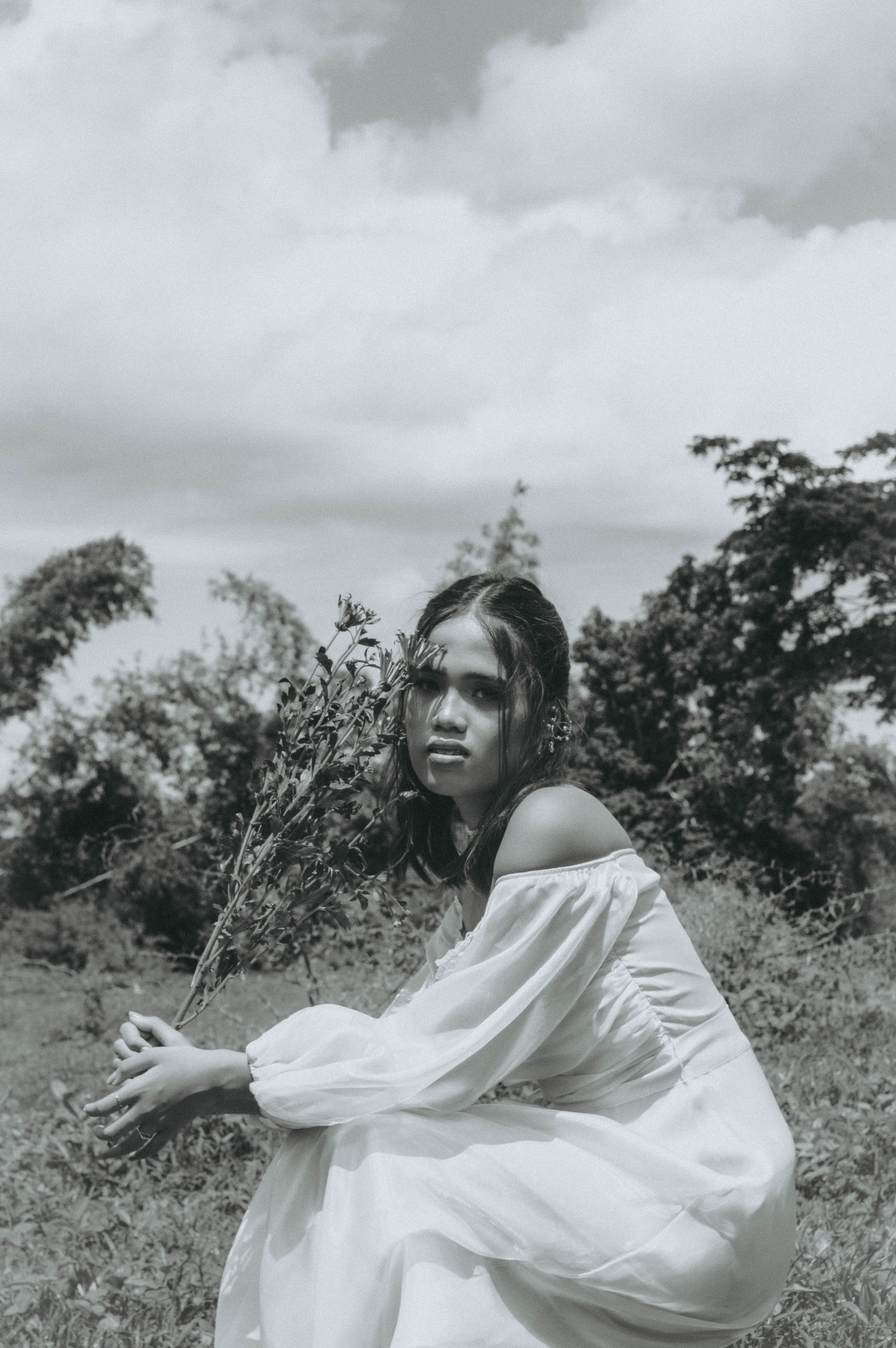 Grayscale Photo of People in Traditional Clothing · Free Stock Photo
