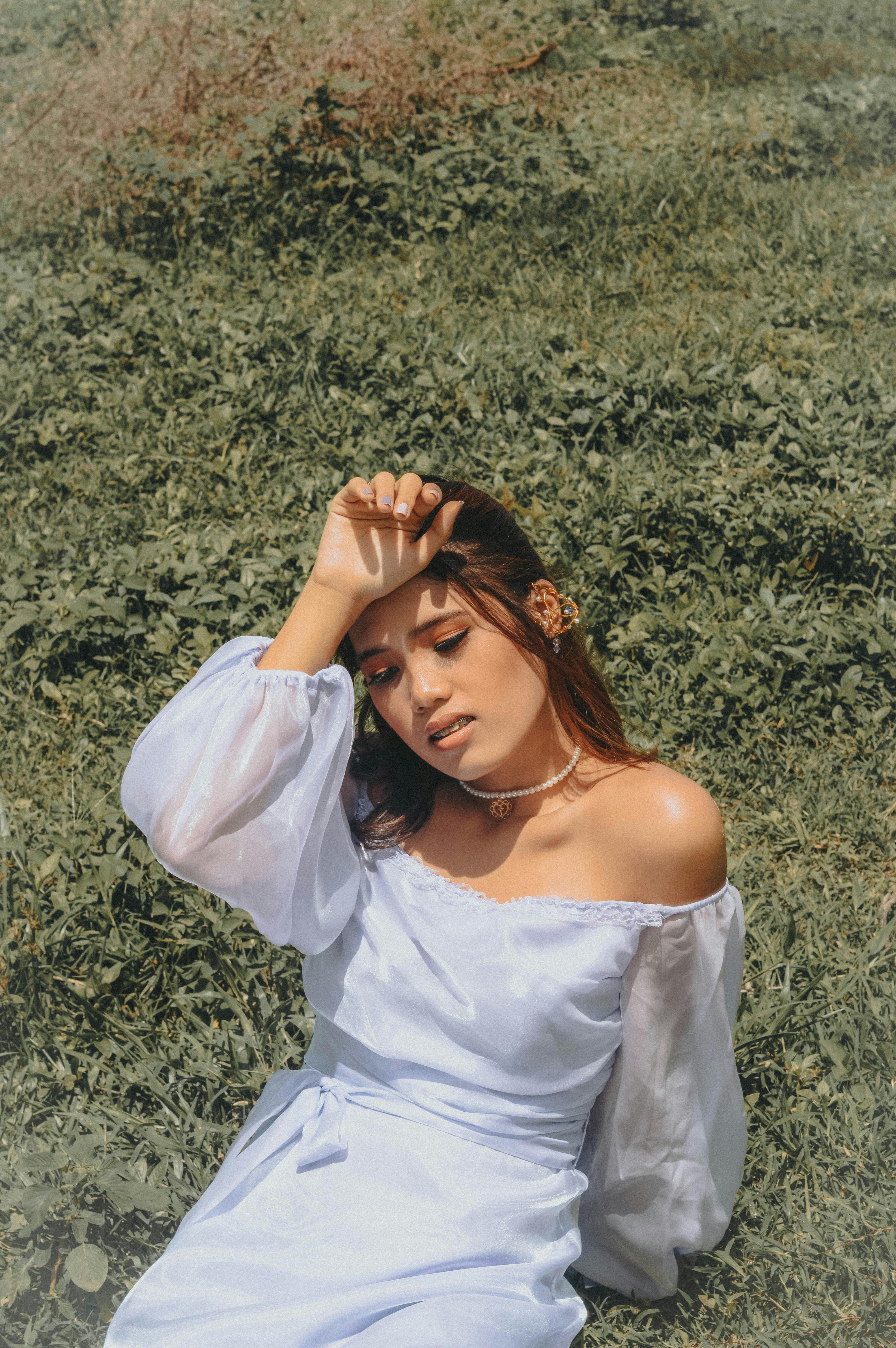 Woman Sitting Down · Free Stock Photo