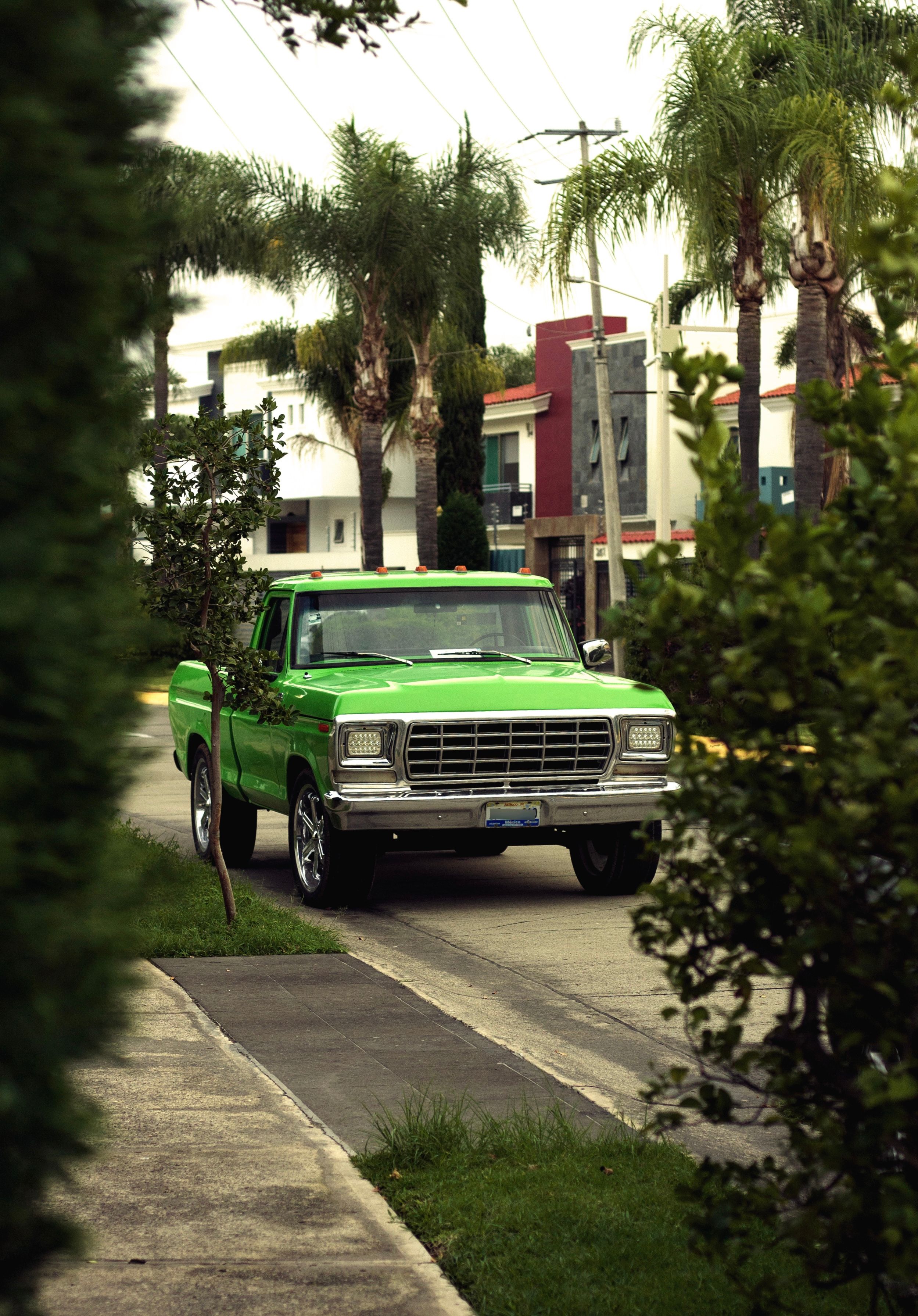 Green Pickup Truck on the Street · Free Stock Photo