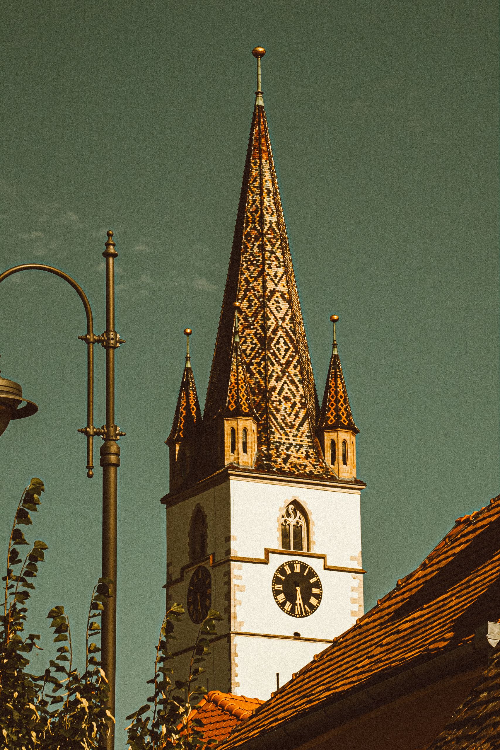 City Street with Cobblestone and a Clock Tower · Free Stock Photo