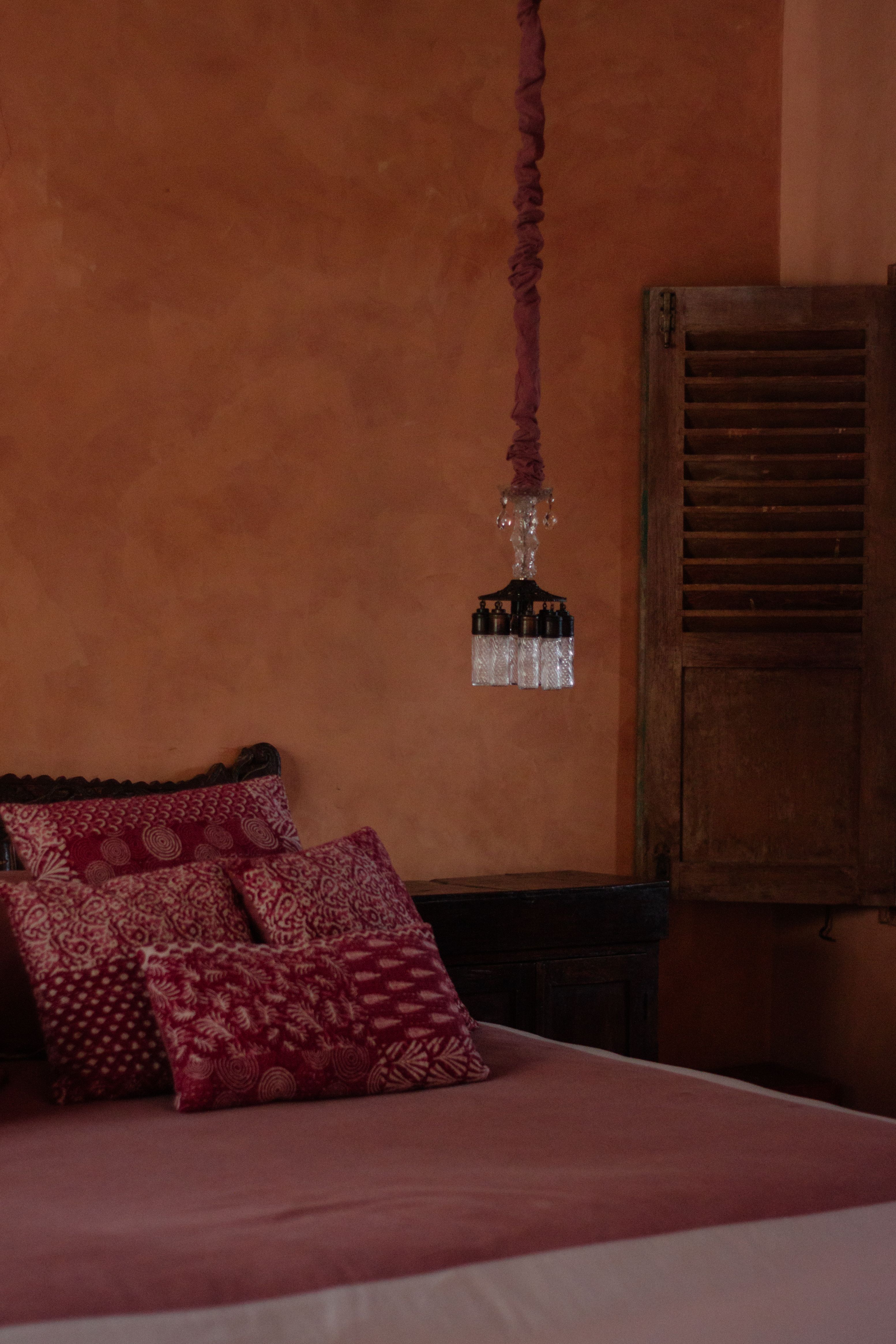 Hanging Lamp over End Table next to Bed · Free Stock Photo