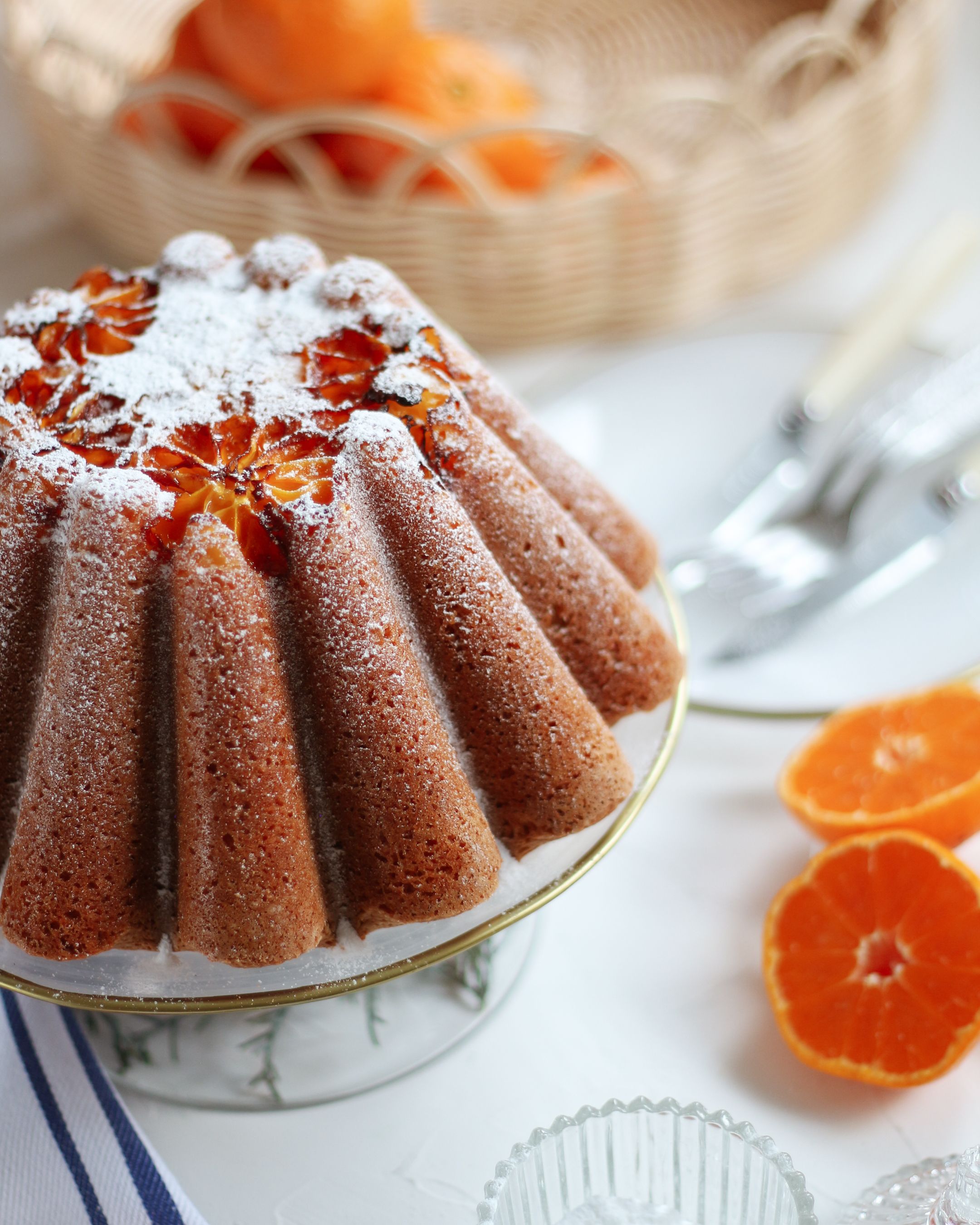 A Cake With Icing Sugar and Sliced Fresh Fruits · Free Stock Photo