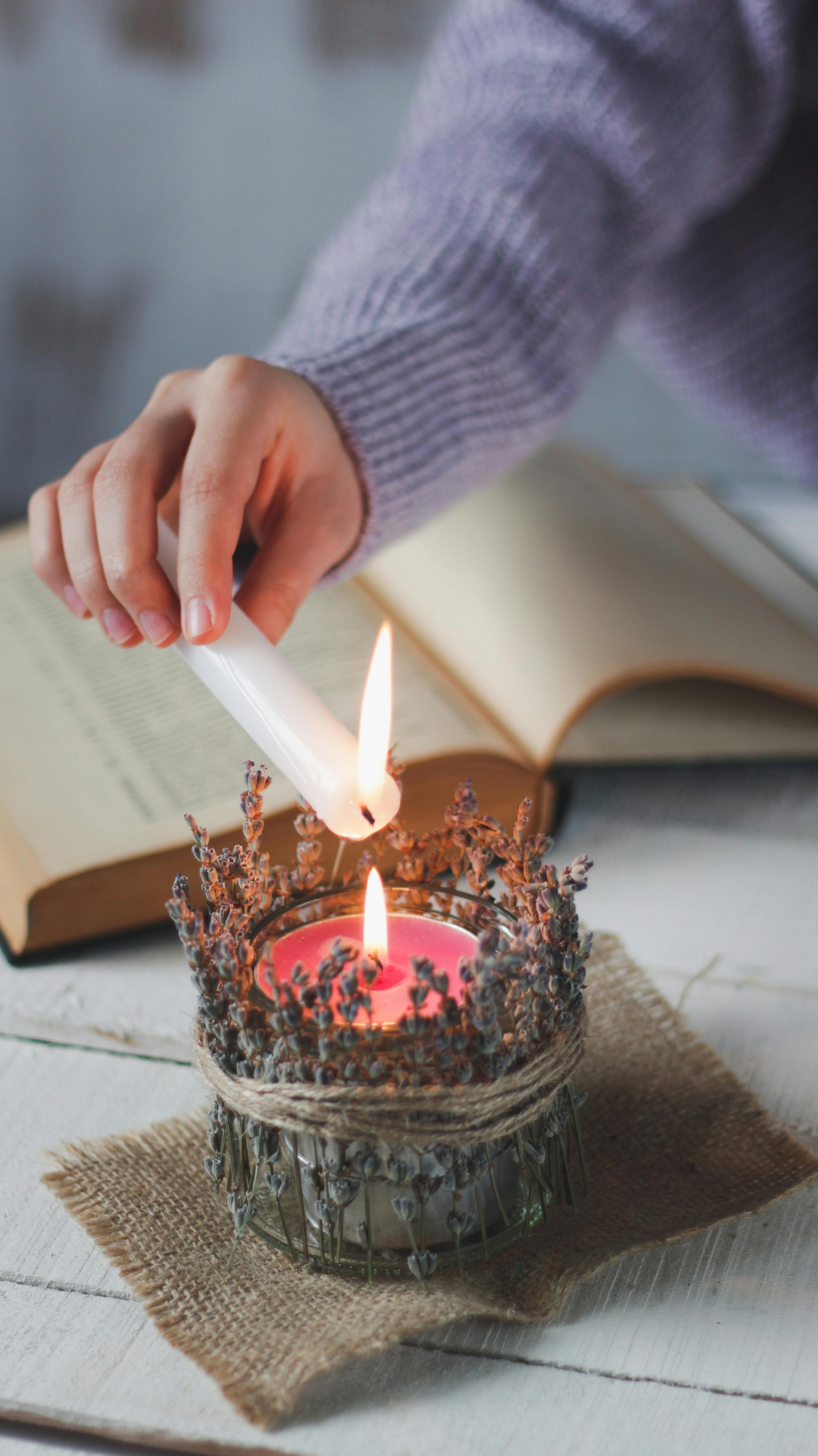 Person Holding Lighted Candle · Free Stock Photo
