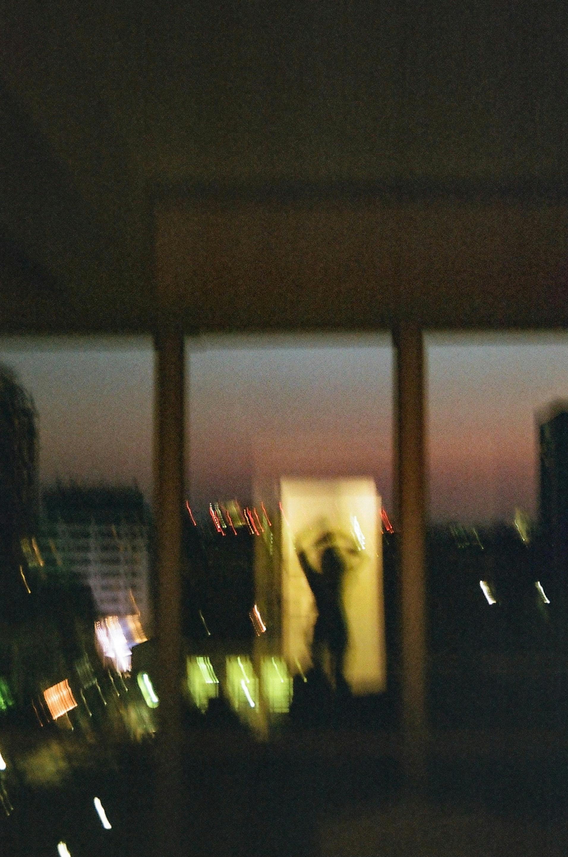 Silhouette of a Person Stand Near the Glass Window · Free Stock Photo