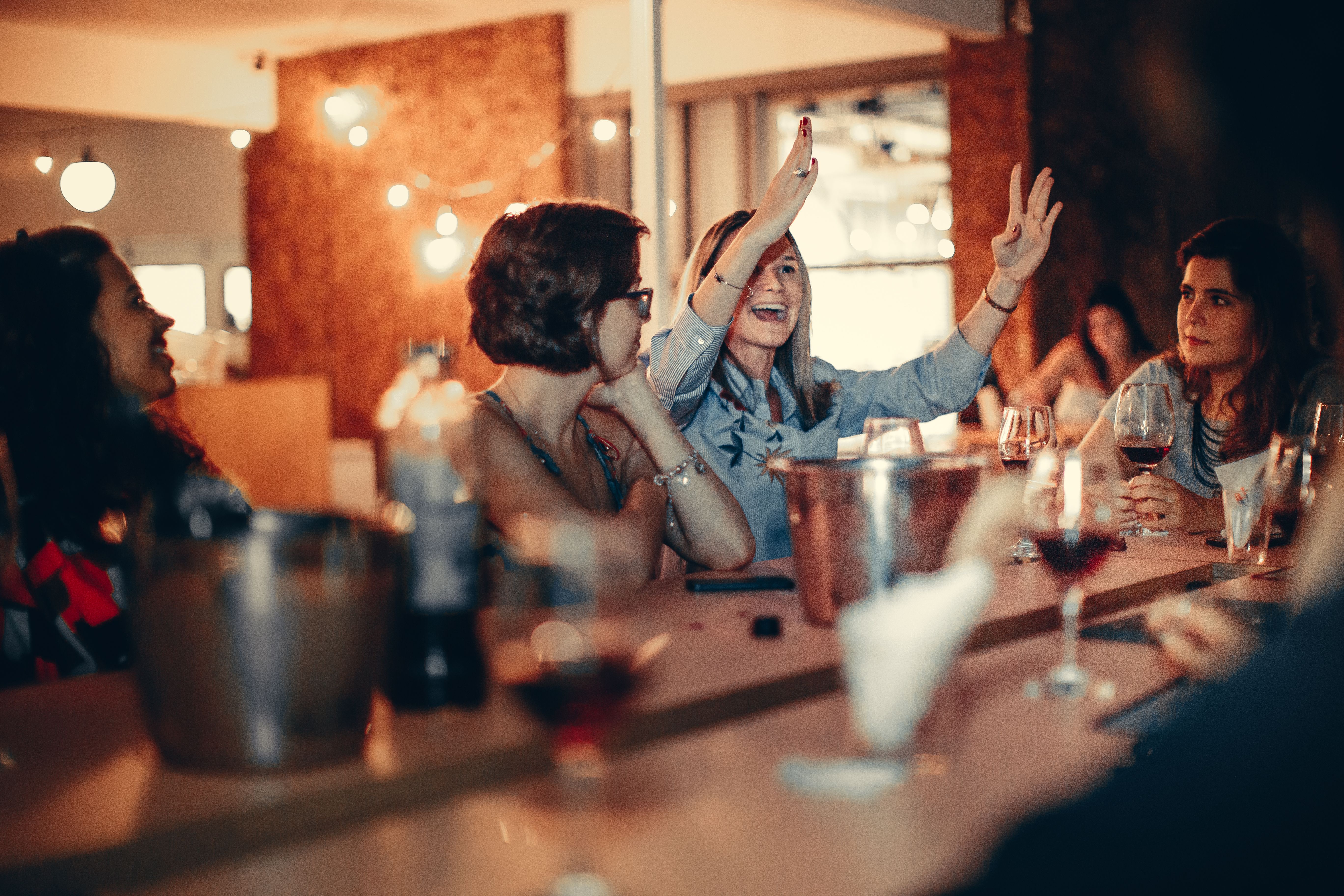Lively Social Gathering at Trendy Bar · Free Stock Photo