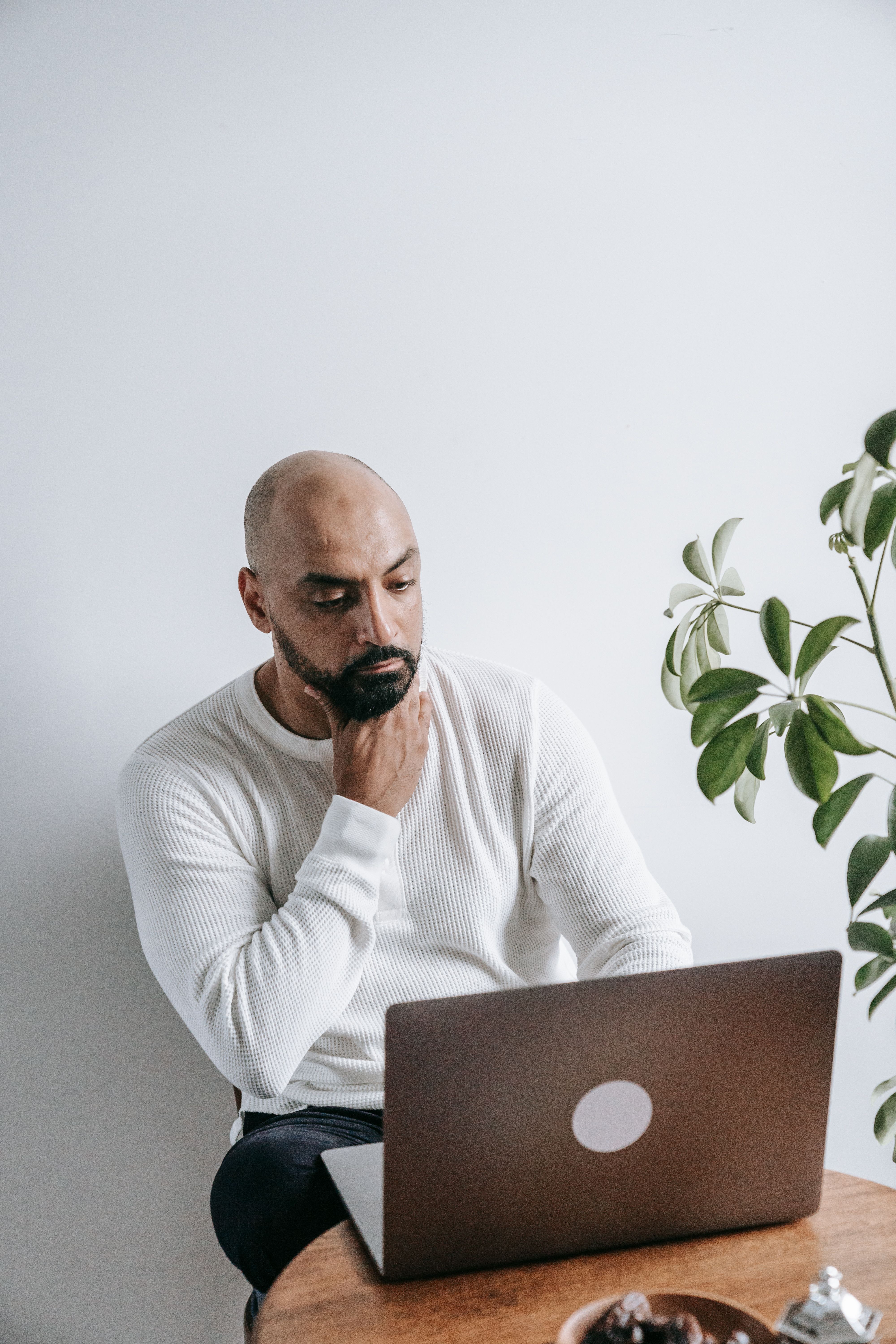 Man working on his Laptop · Free Stock Photo
