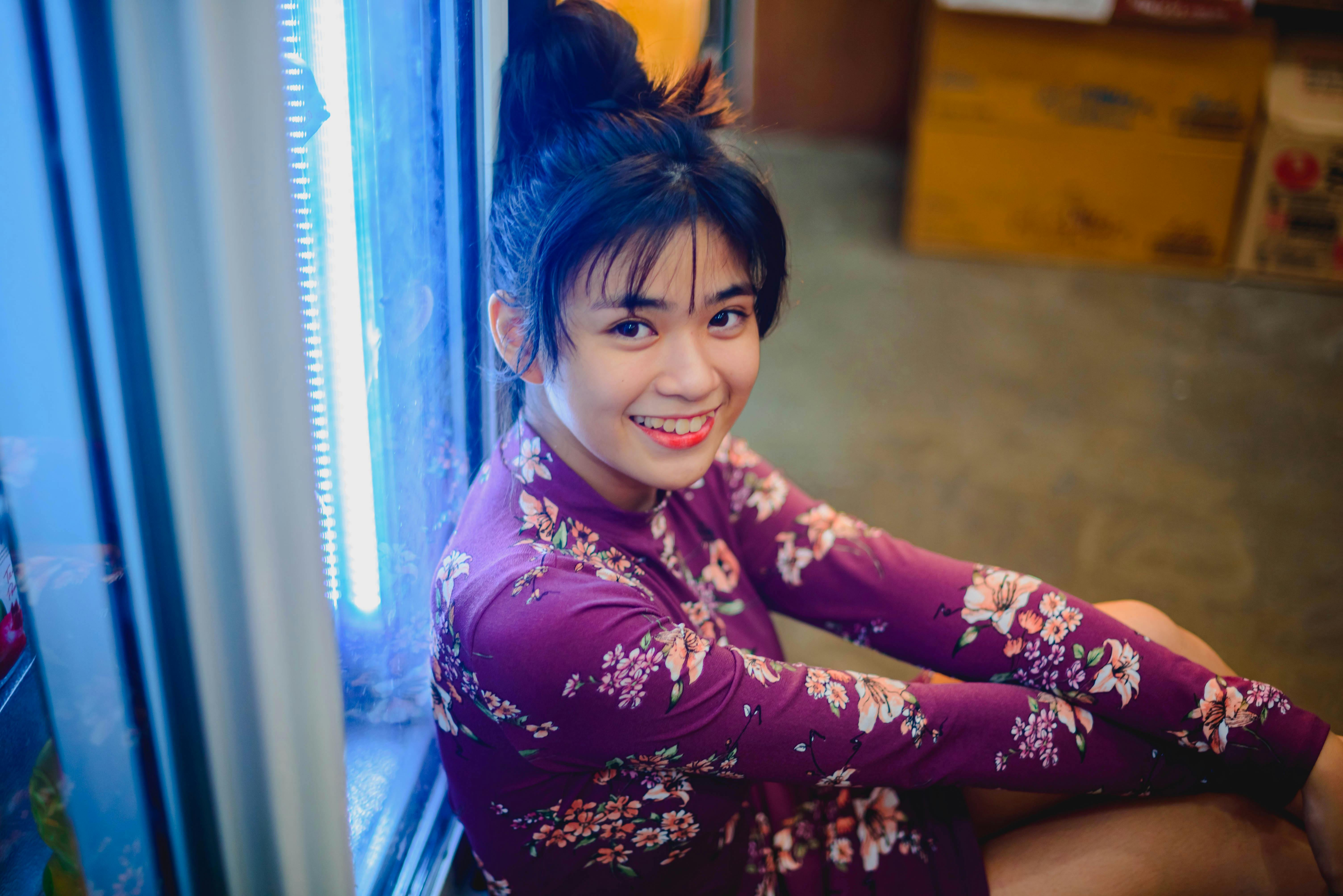 Woman in Blue Dress and Embroidered Blouse · Free Stock Photo