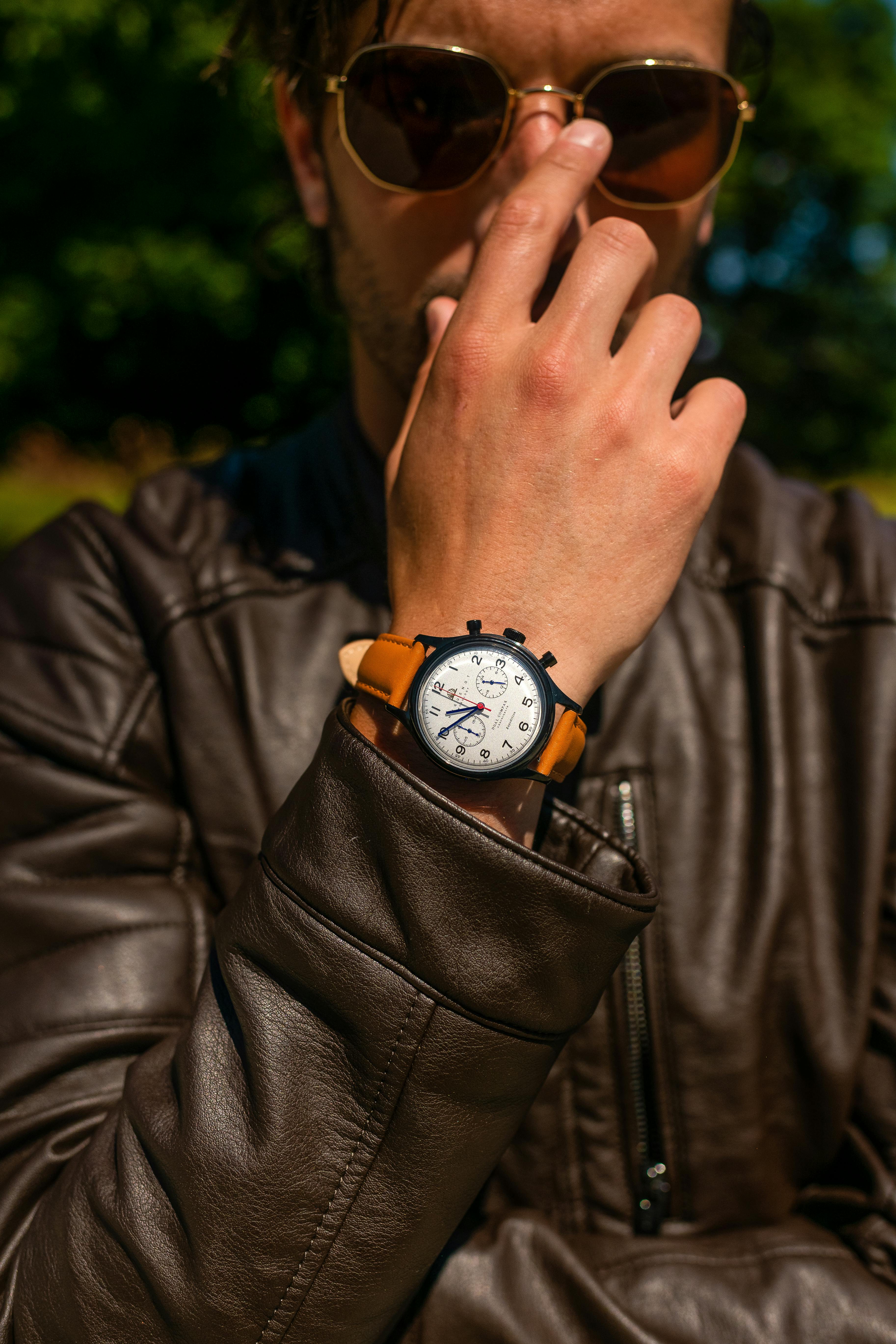 A Man Wearing a Wristwatch · Free Stock Photo