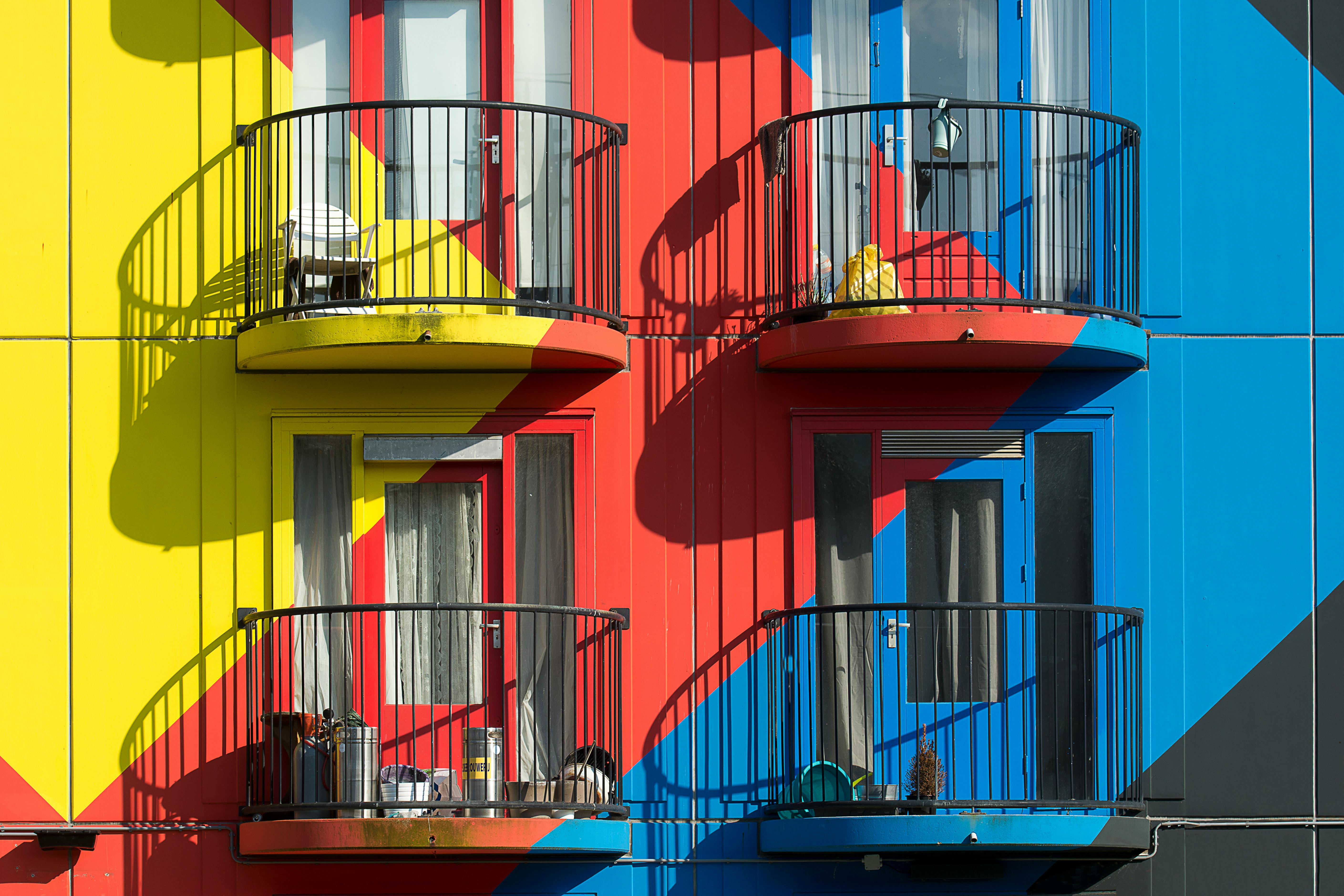 Multi-colored Concrete Building · Free Stock Photo