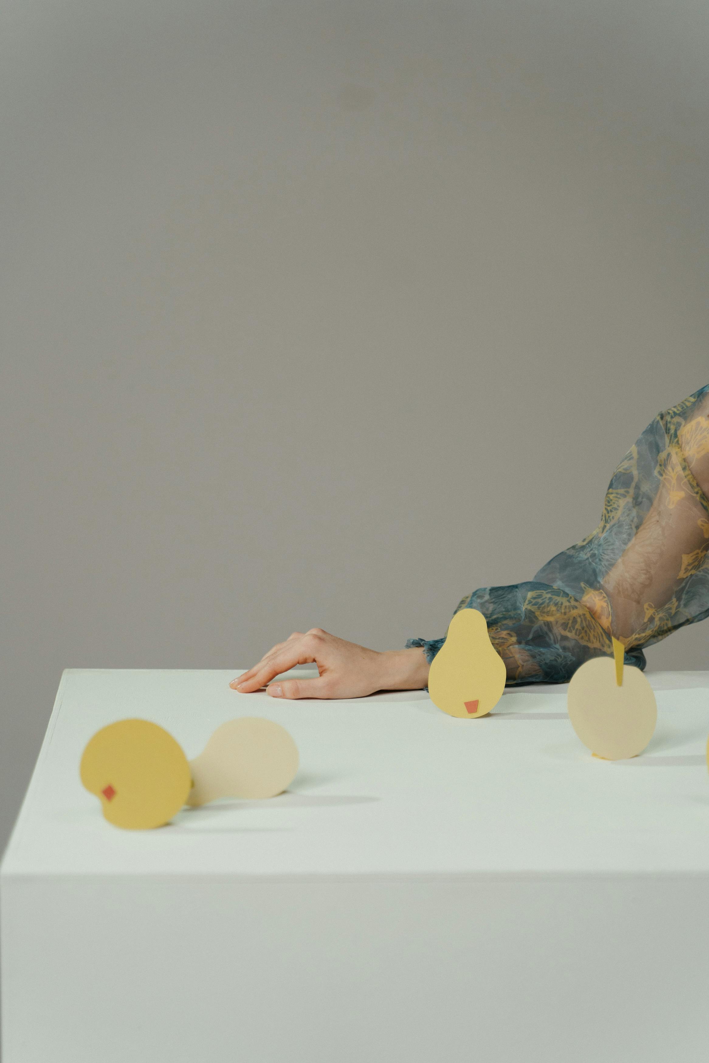 Yellow Pear Paper Craft on White Surface · Free Stock Photo