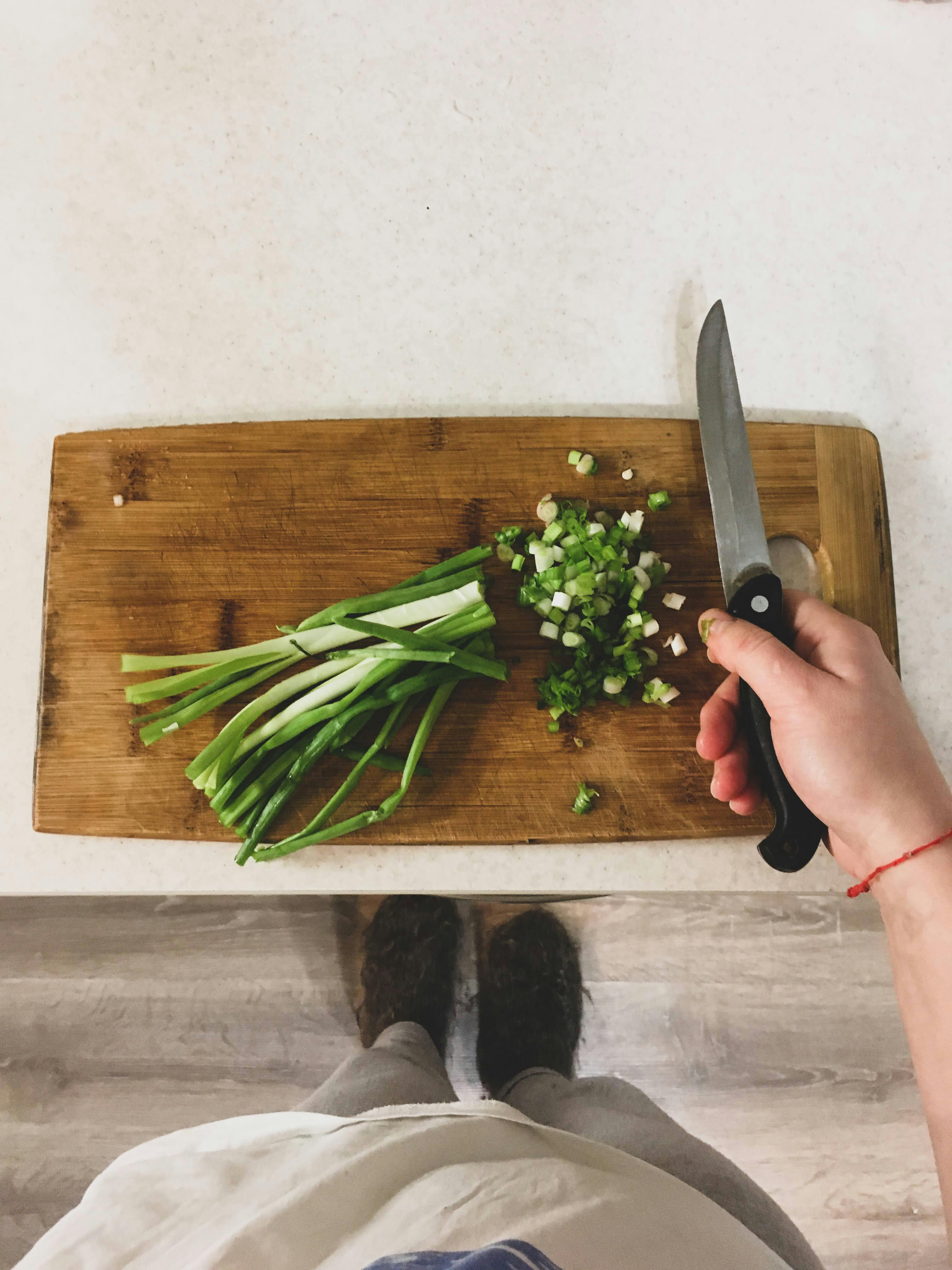 A Person Holding a Knife · Free Stock Photo