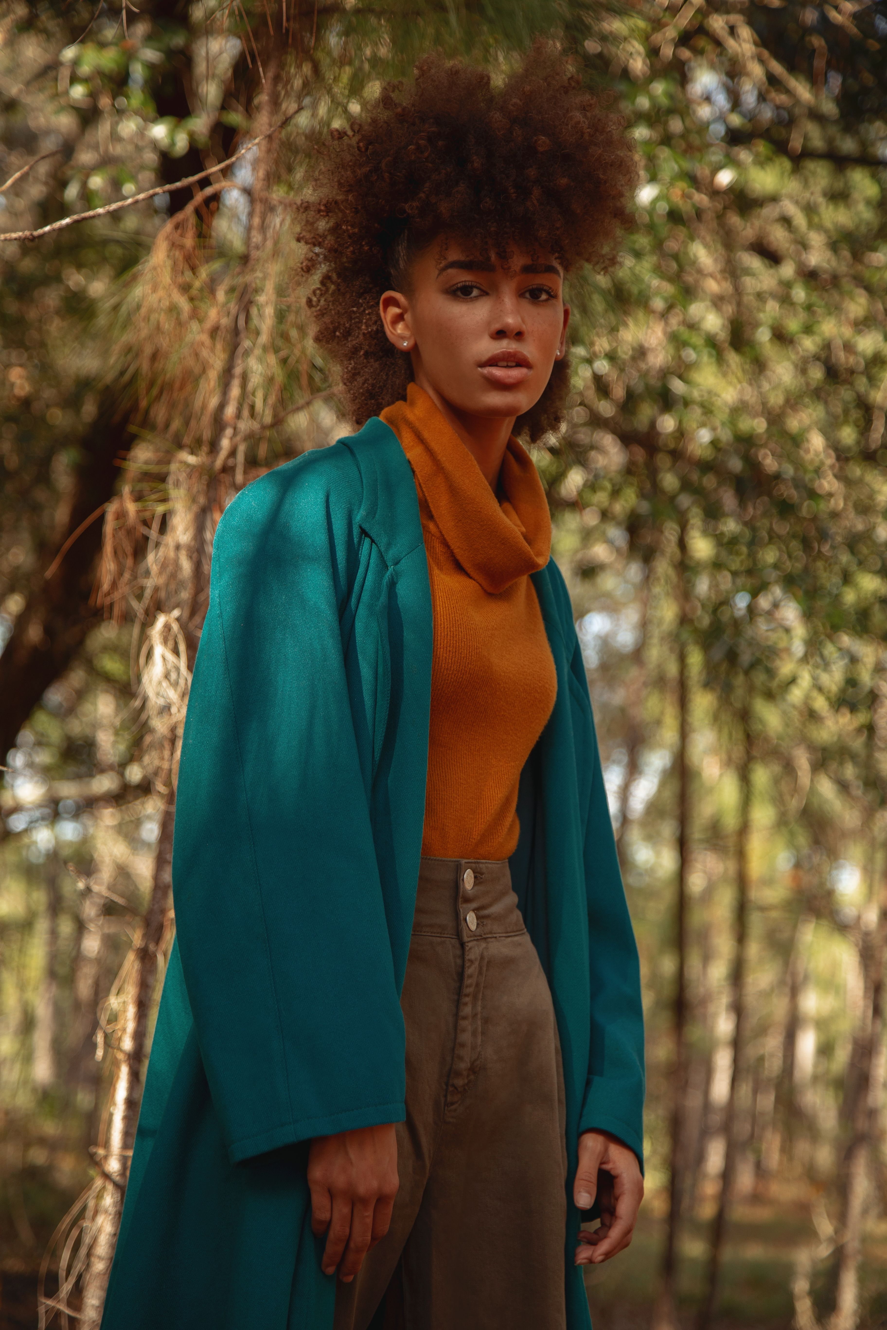Woman Wearing Green Coat Standing Under a Tree · Free Stock Photo