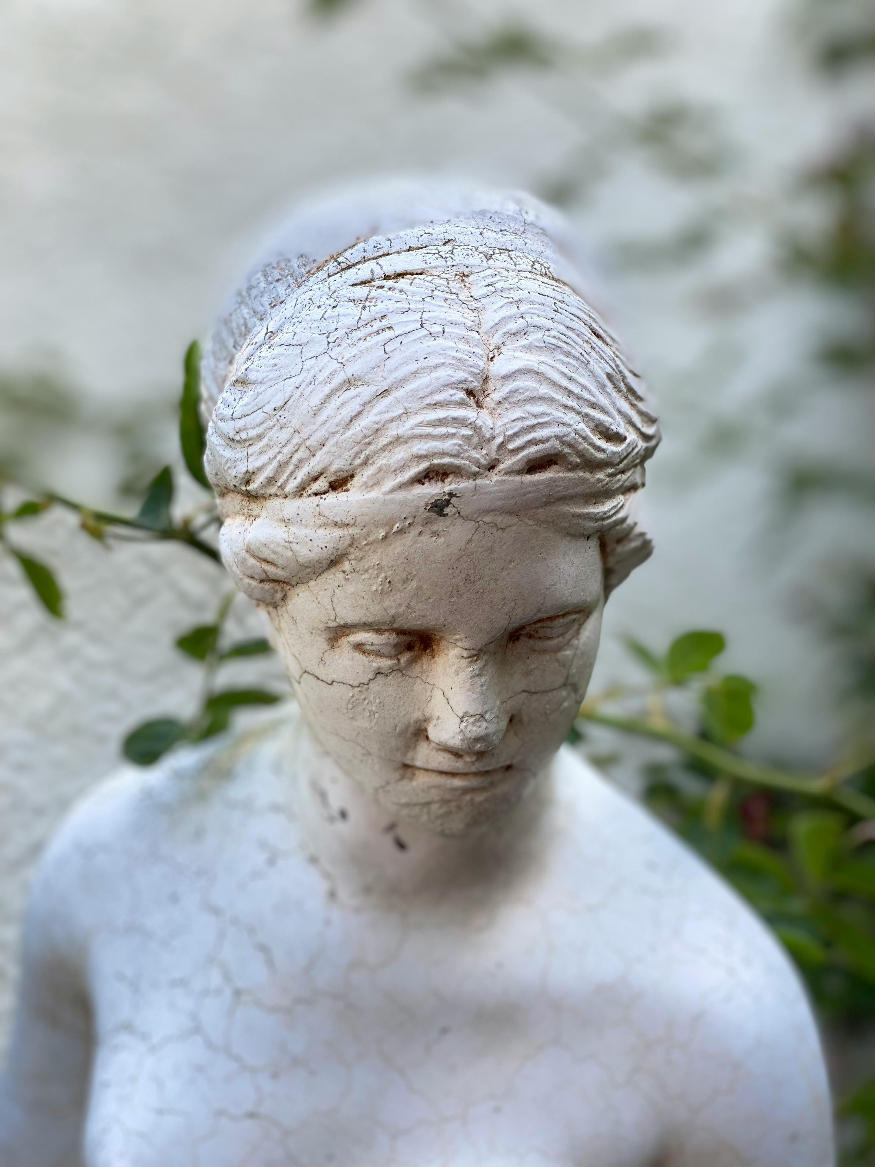 A White Concrete Statue · Free Stock Photo