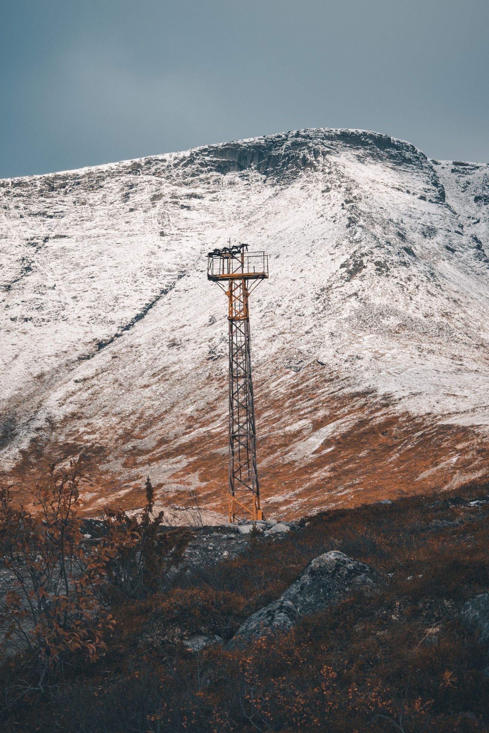 Brown Wooden Tower on Top of Gray Mountain · Free Stock Photo
