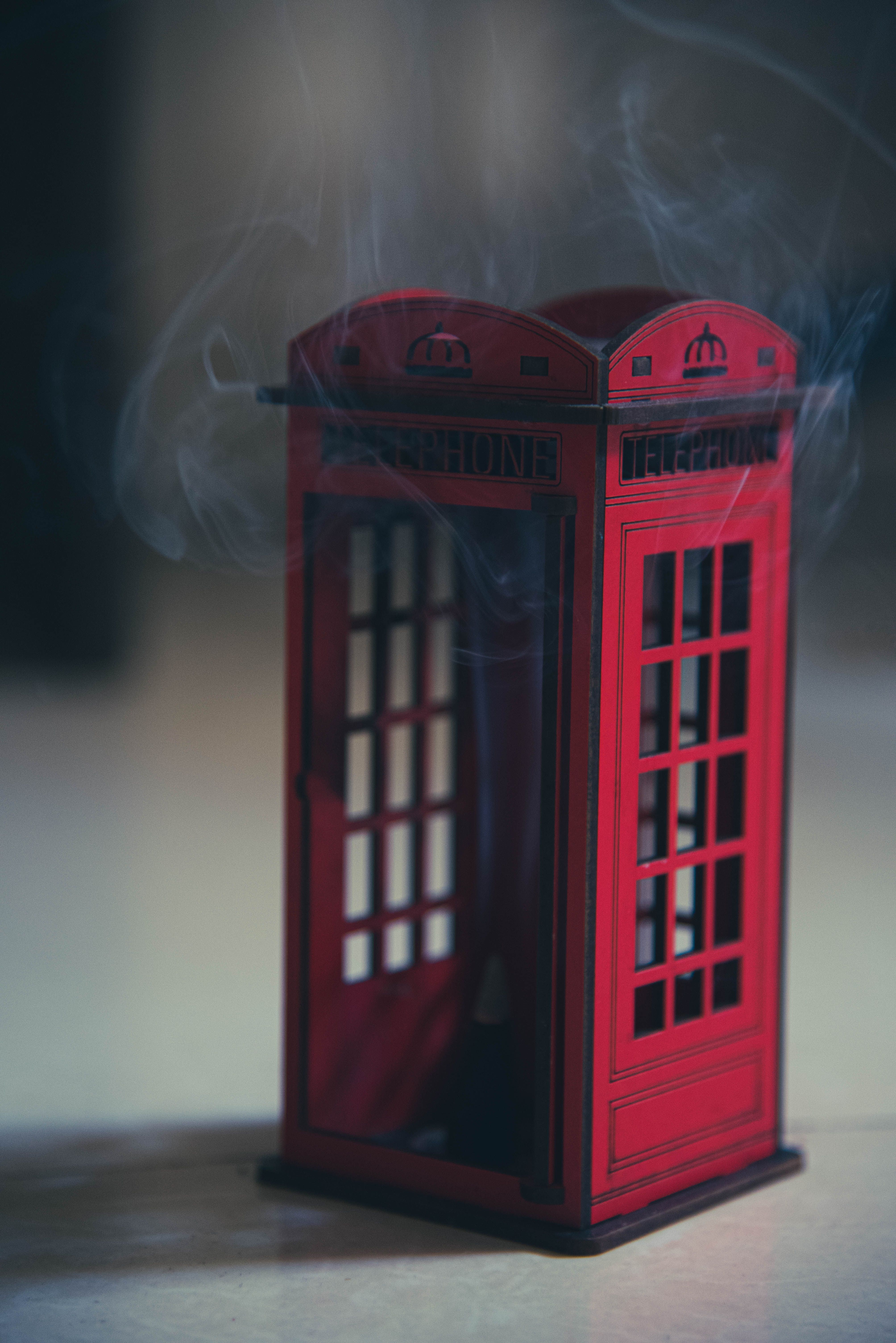 Red Telephone Booth with Smoke · Free Stock Photo