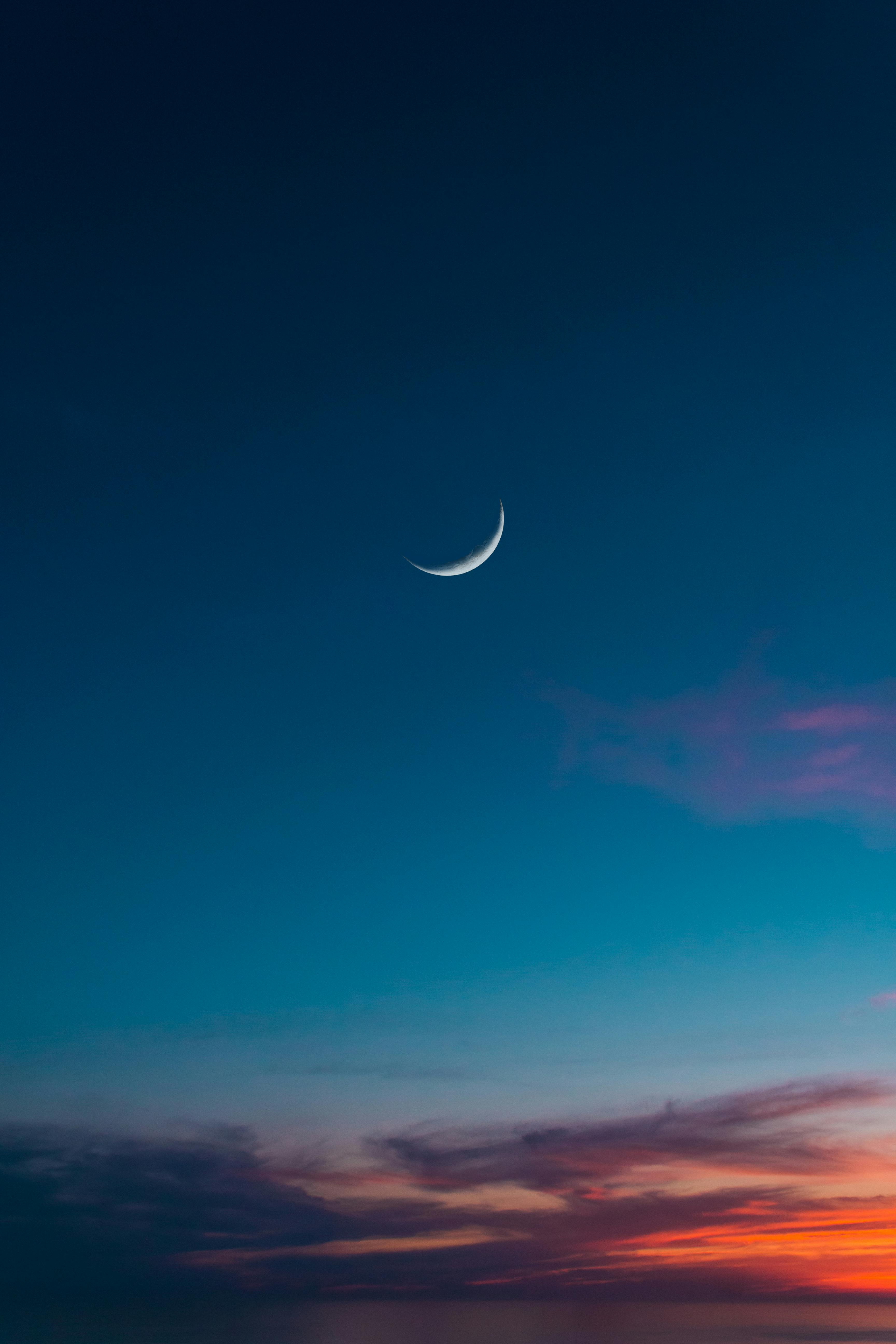 Crescent Moon Over a Beautiful Sky · Free Stock Photo