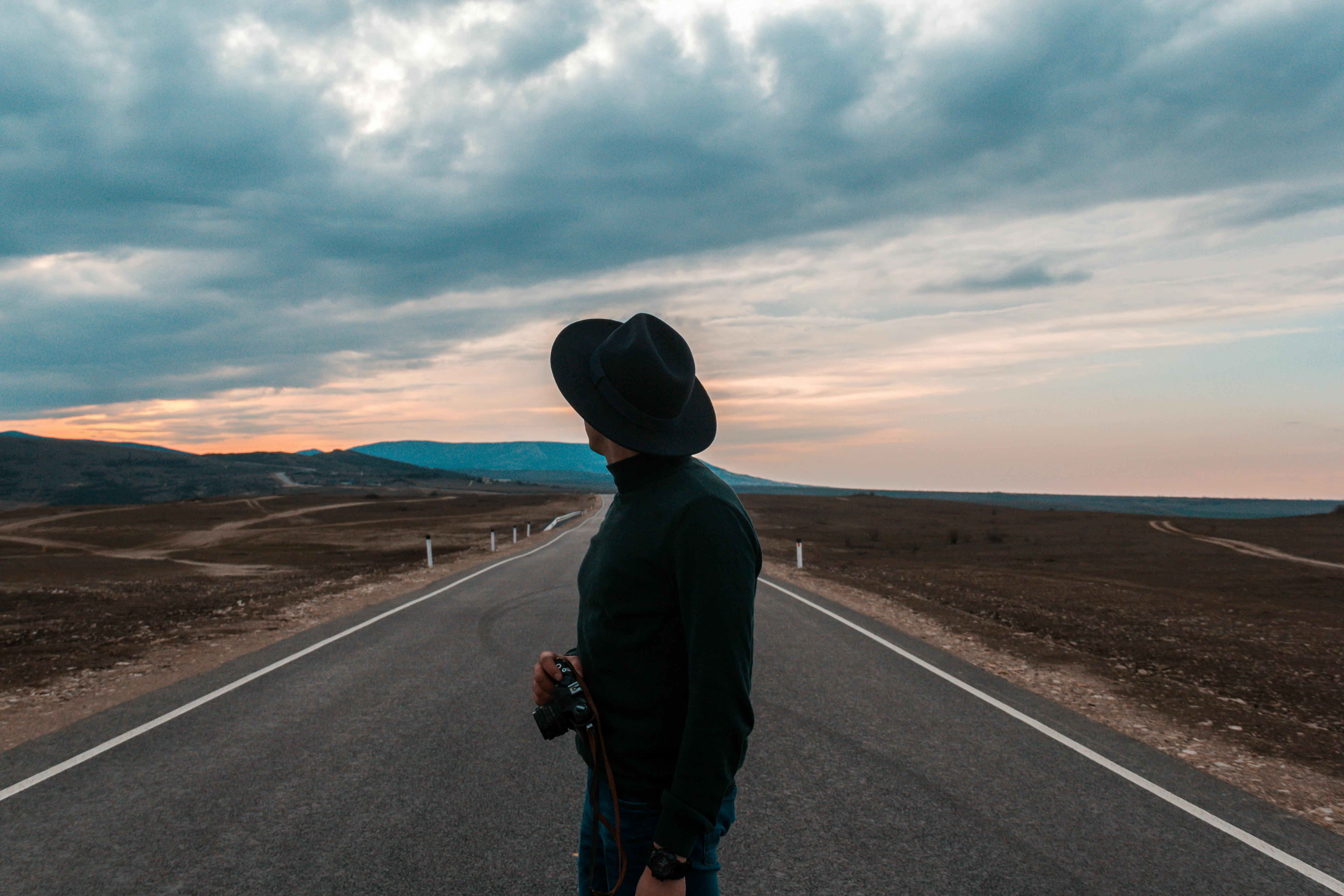 A Man Looking Over His Shoulder · Free Stock Photo