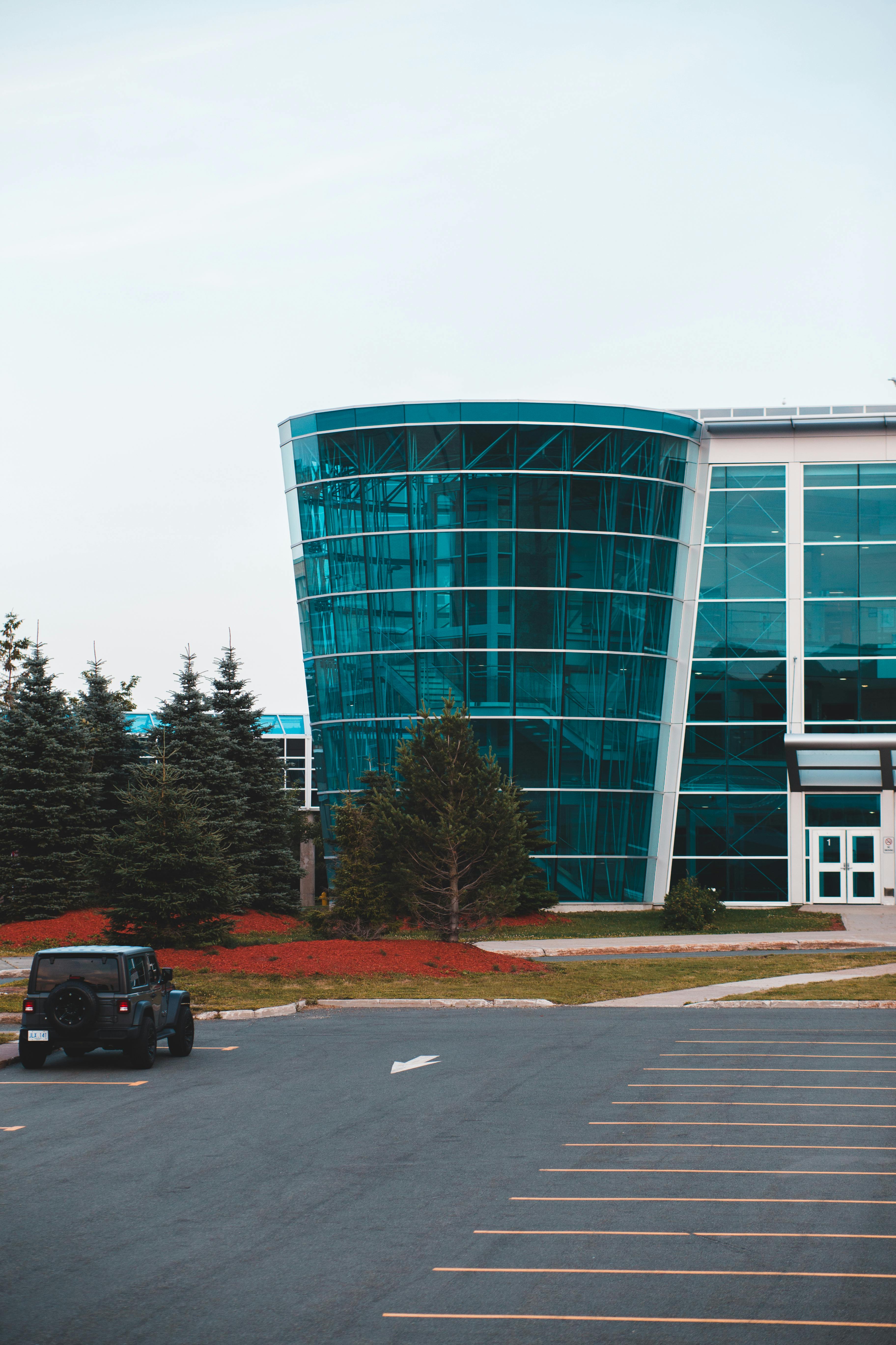 Glass Building with Parking Space · Free Stock Photo