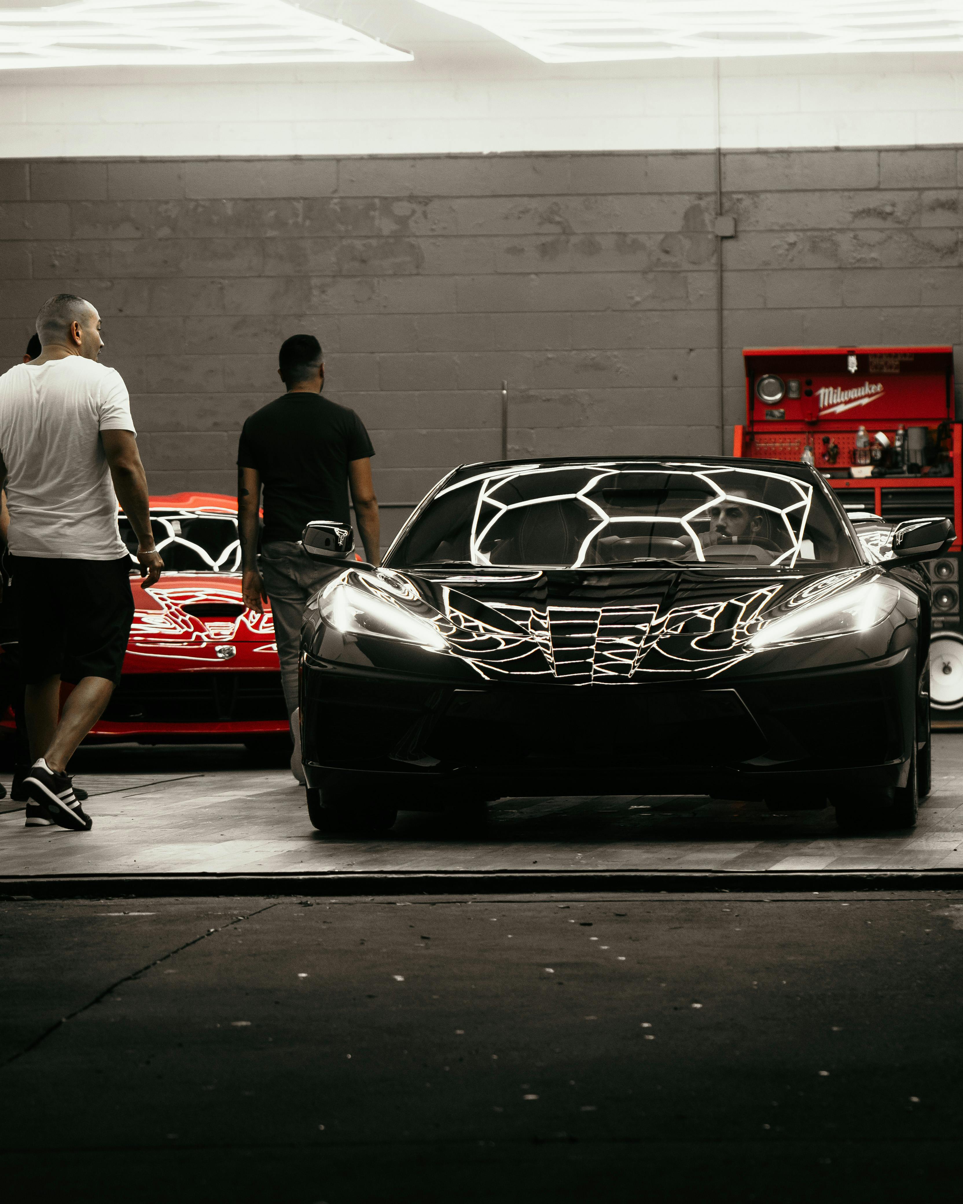 Black Mclaren in a Garage · Free Stock Photo