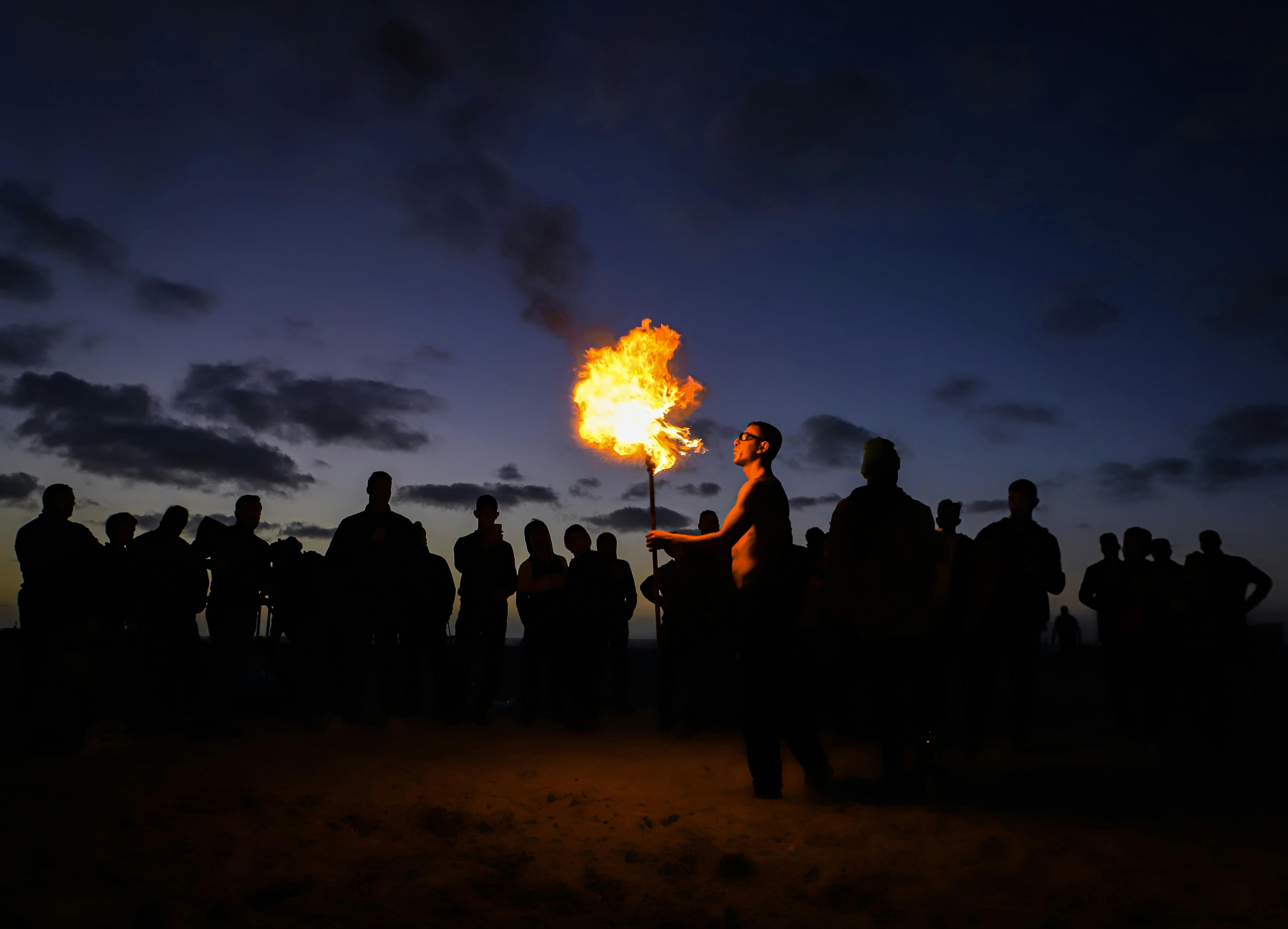 Skilled Person doing a Fire Performance in Front of People · Free Stock ...