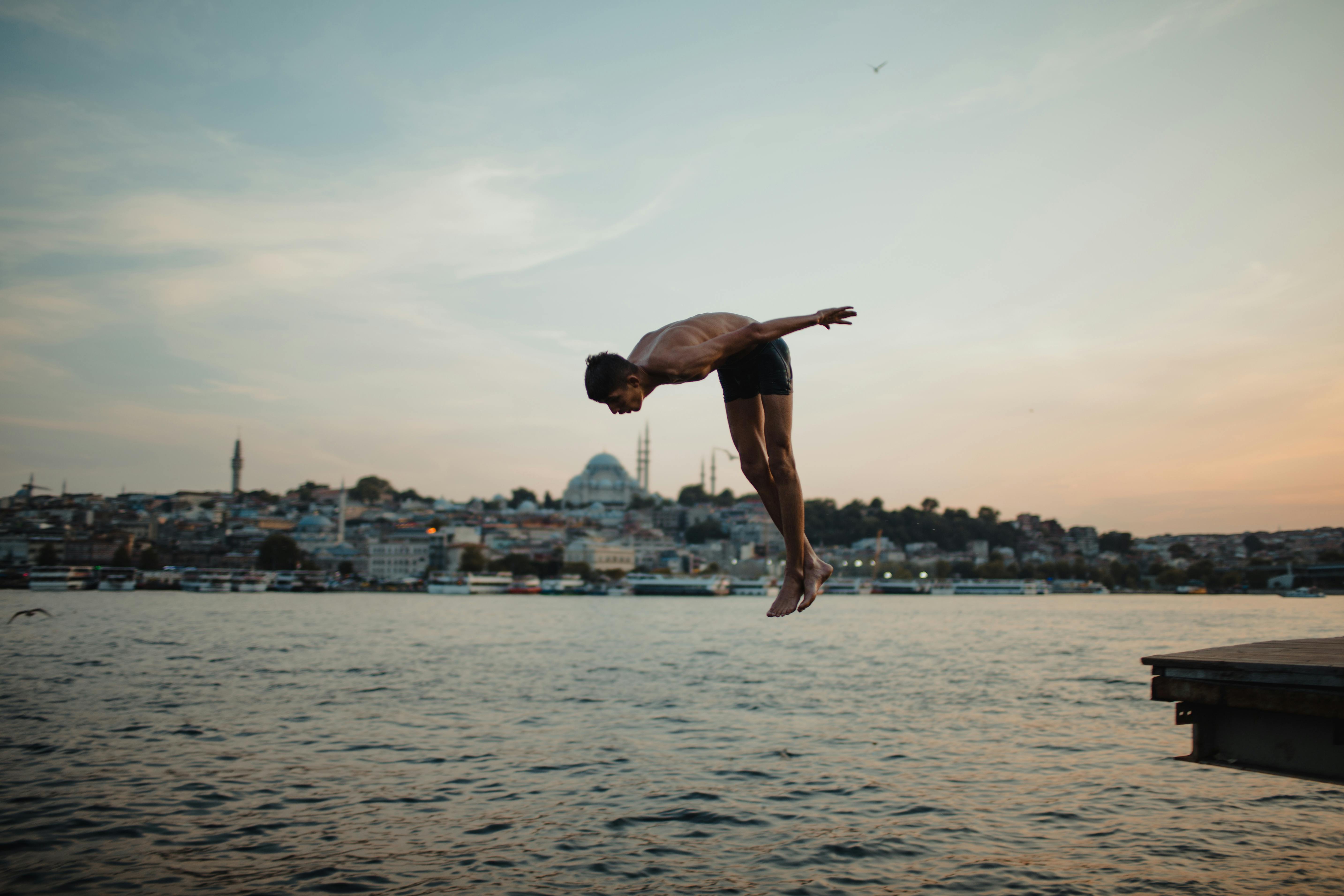 A Man Diving at the Beach · Free Stock Photo