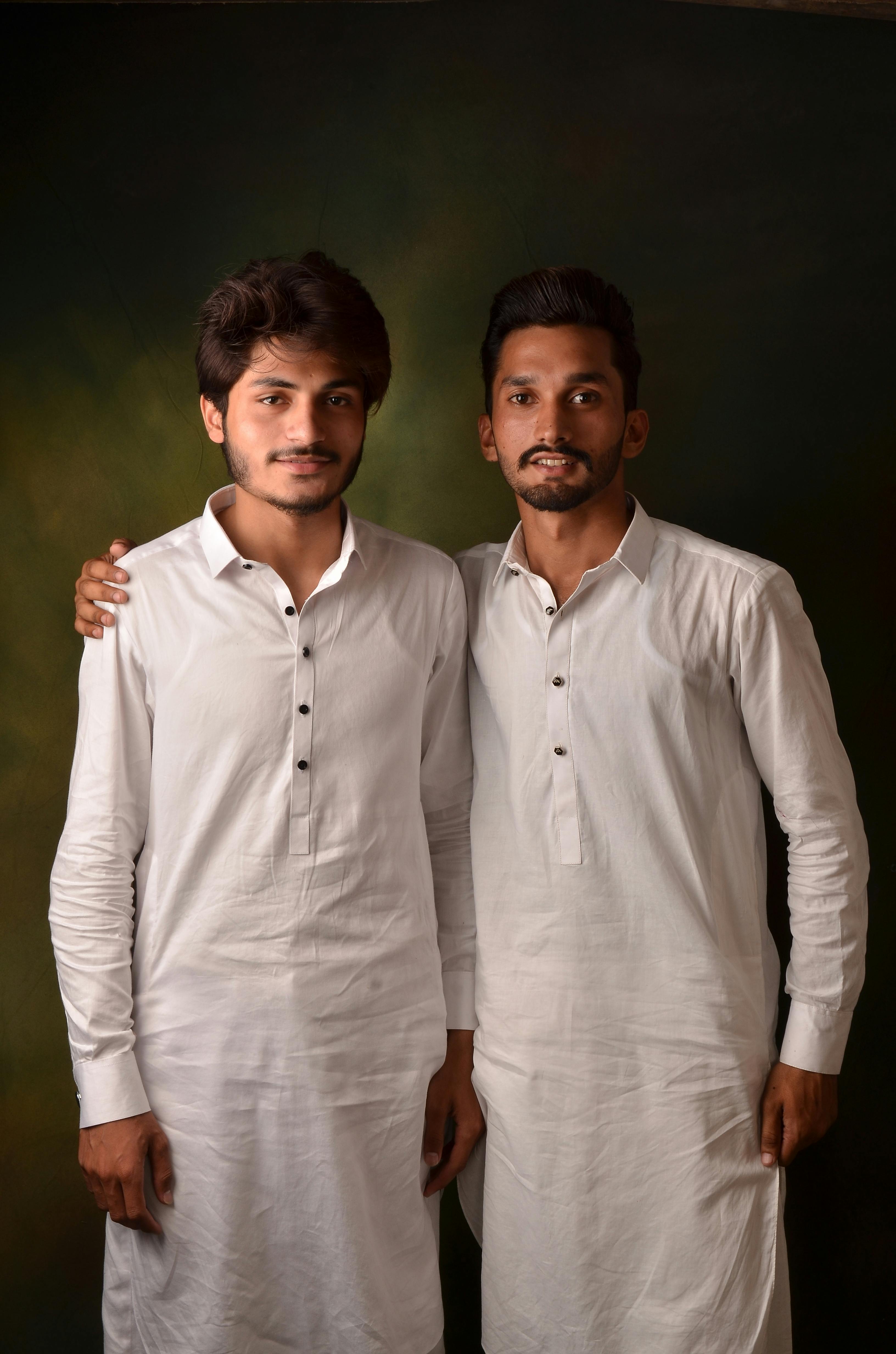 A Man Posing with a Frame · Free Stock Photo