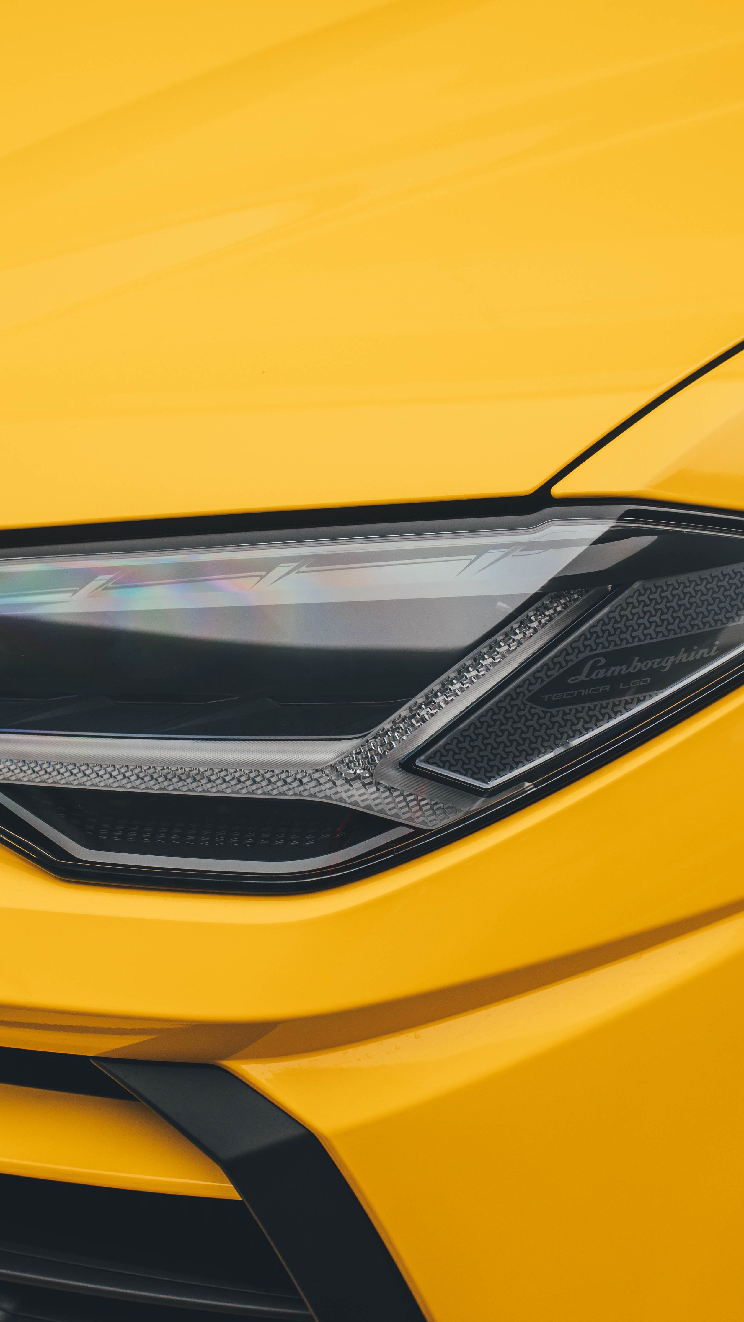 A Close-up of a Yellow Car · Free Stock Photo